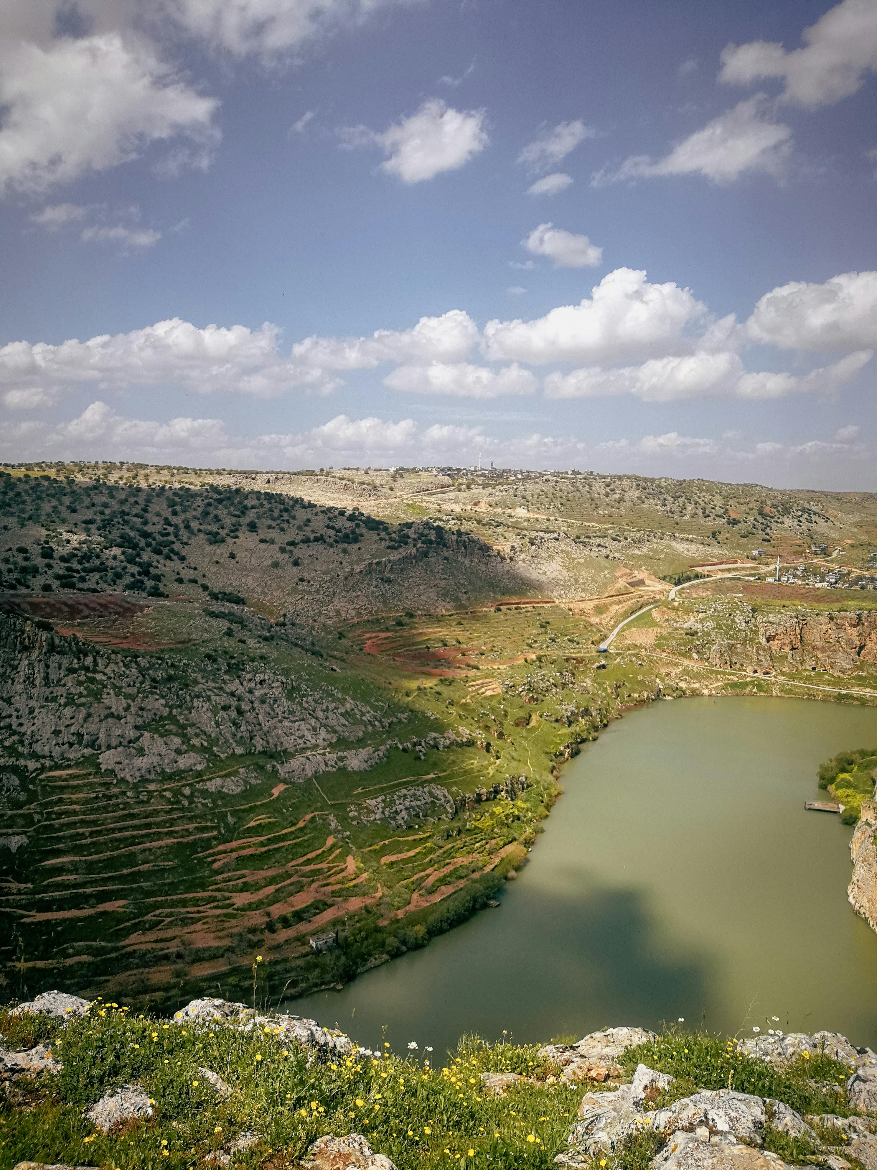 Aerial View of a River Flowing in a Valley · Free Stock Photo