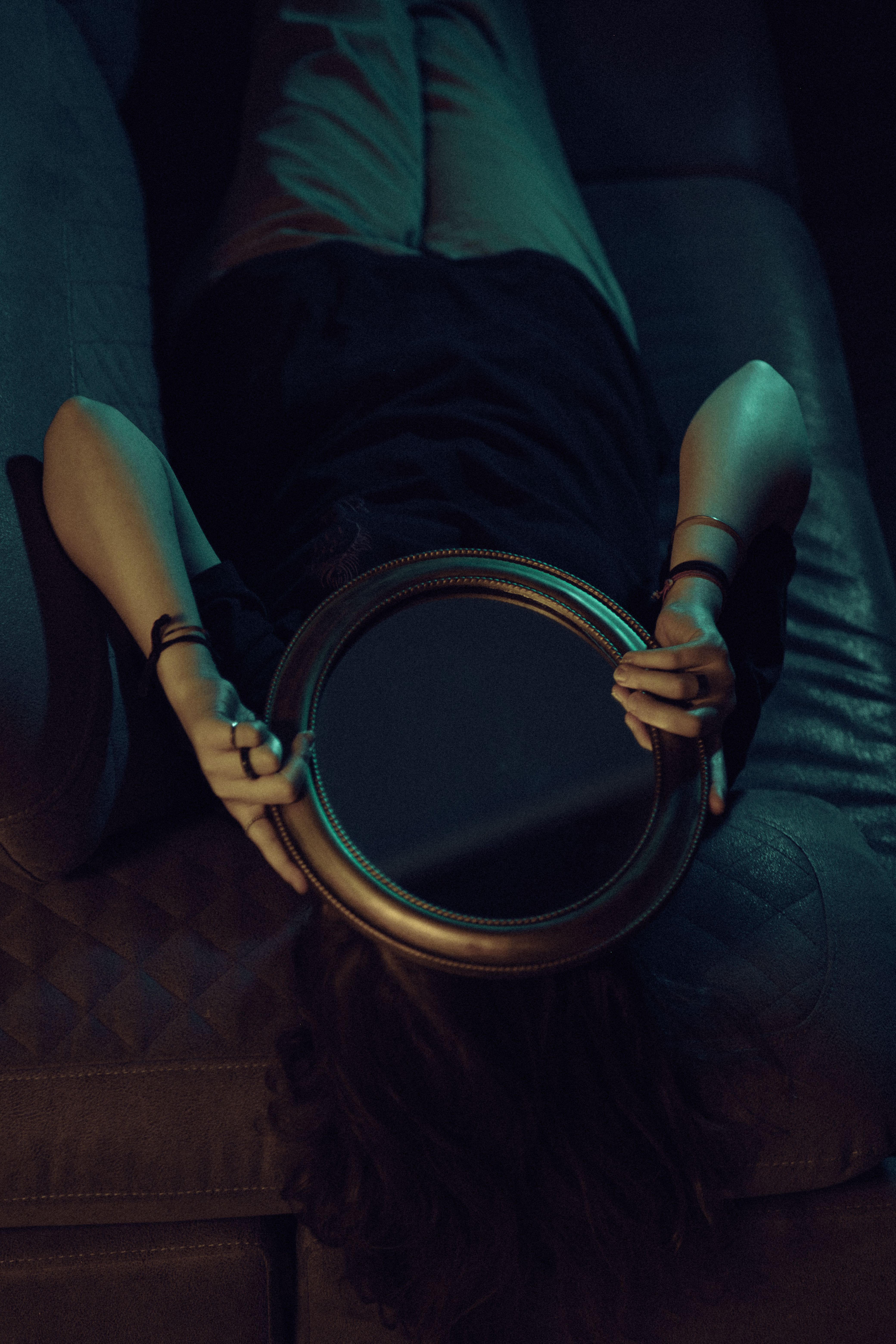 Lying Woman Covering Face with Mirror · Free Stock Photo