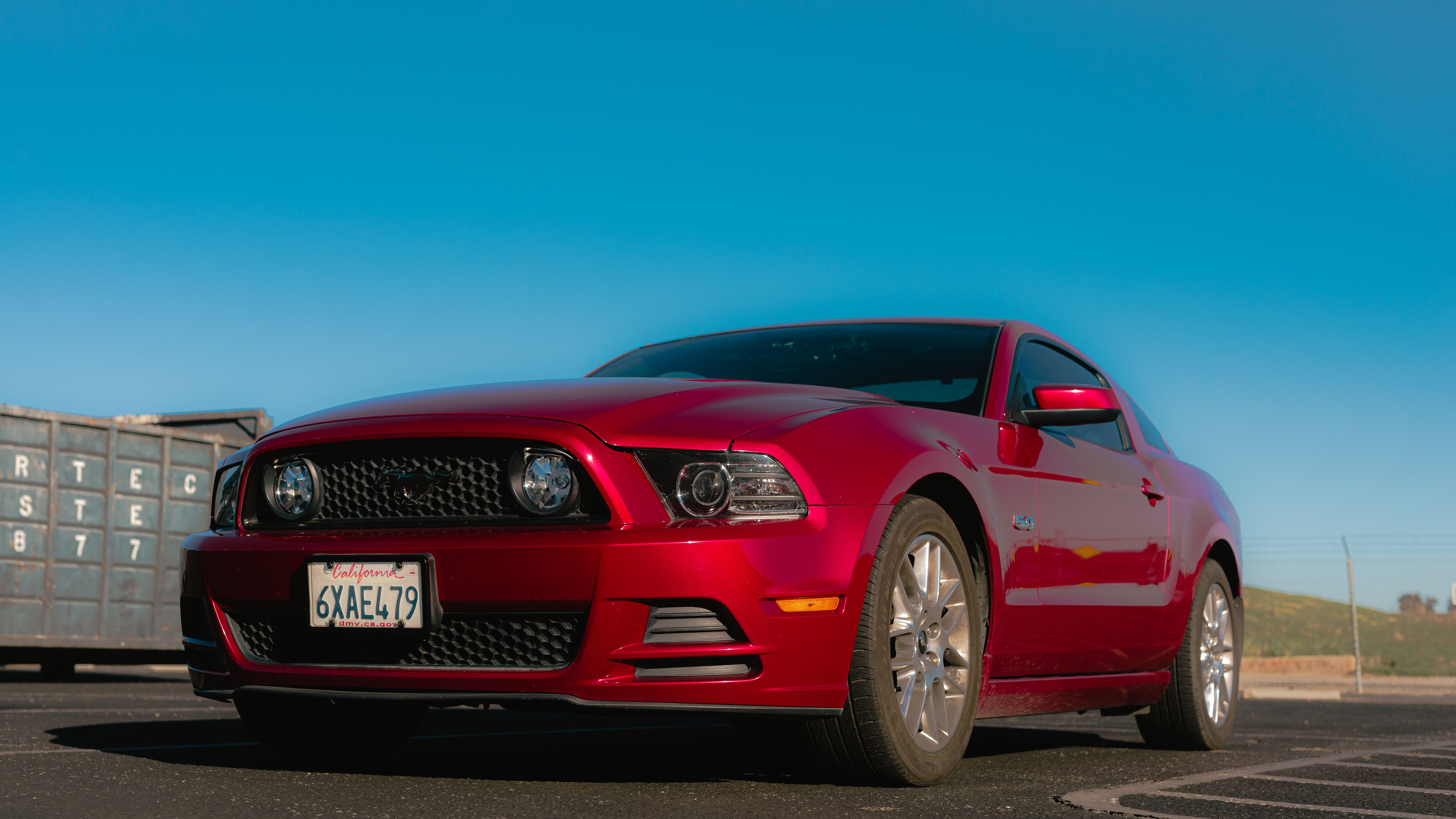 Red Car Parked on the Asphalt · Free Stock Photo