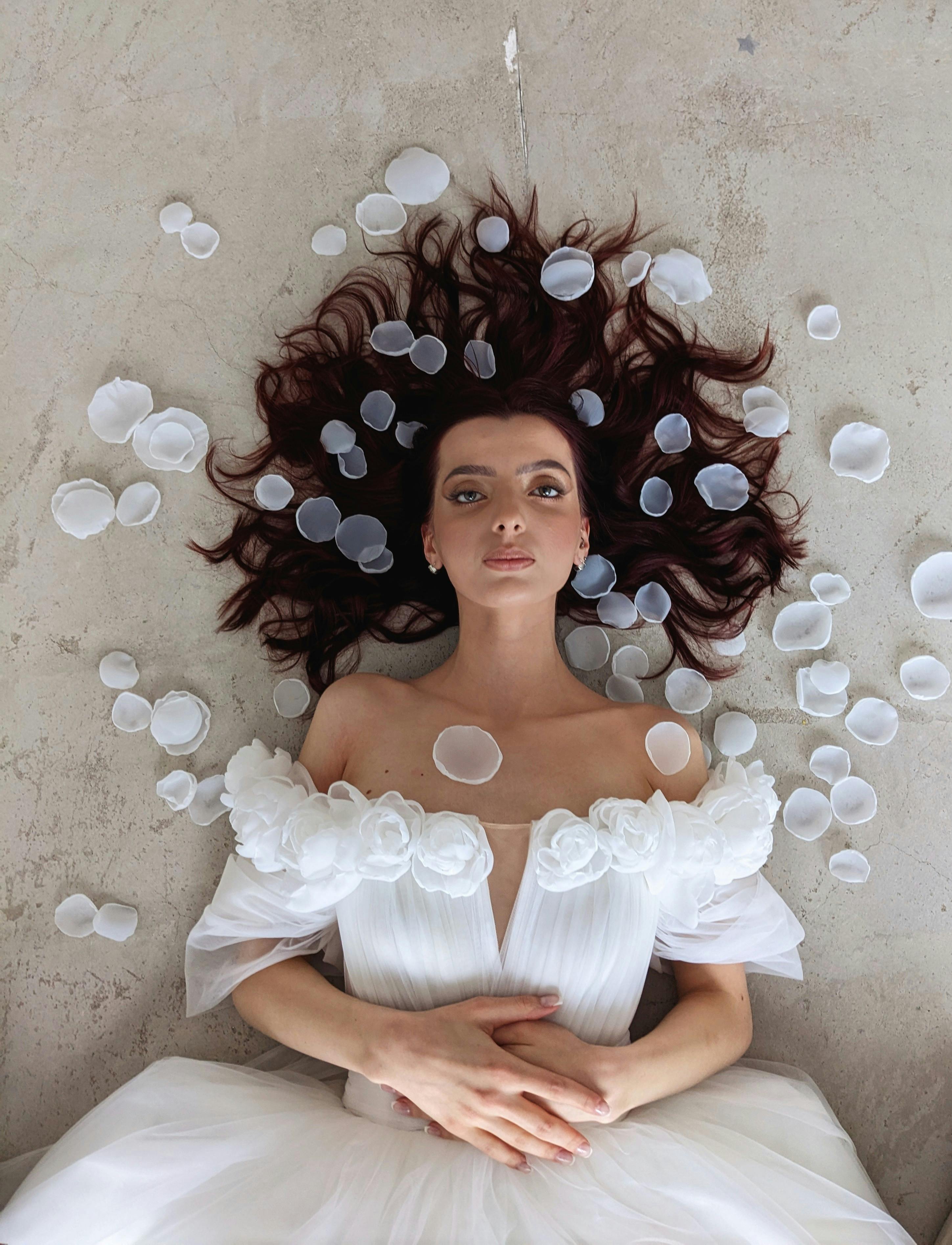 Woman Lying Down and Posing · Free Stock Photo