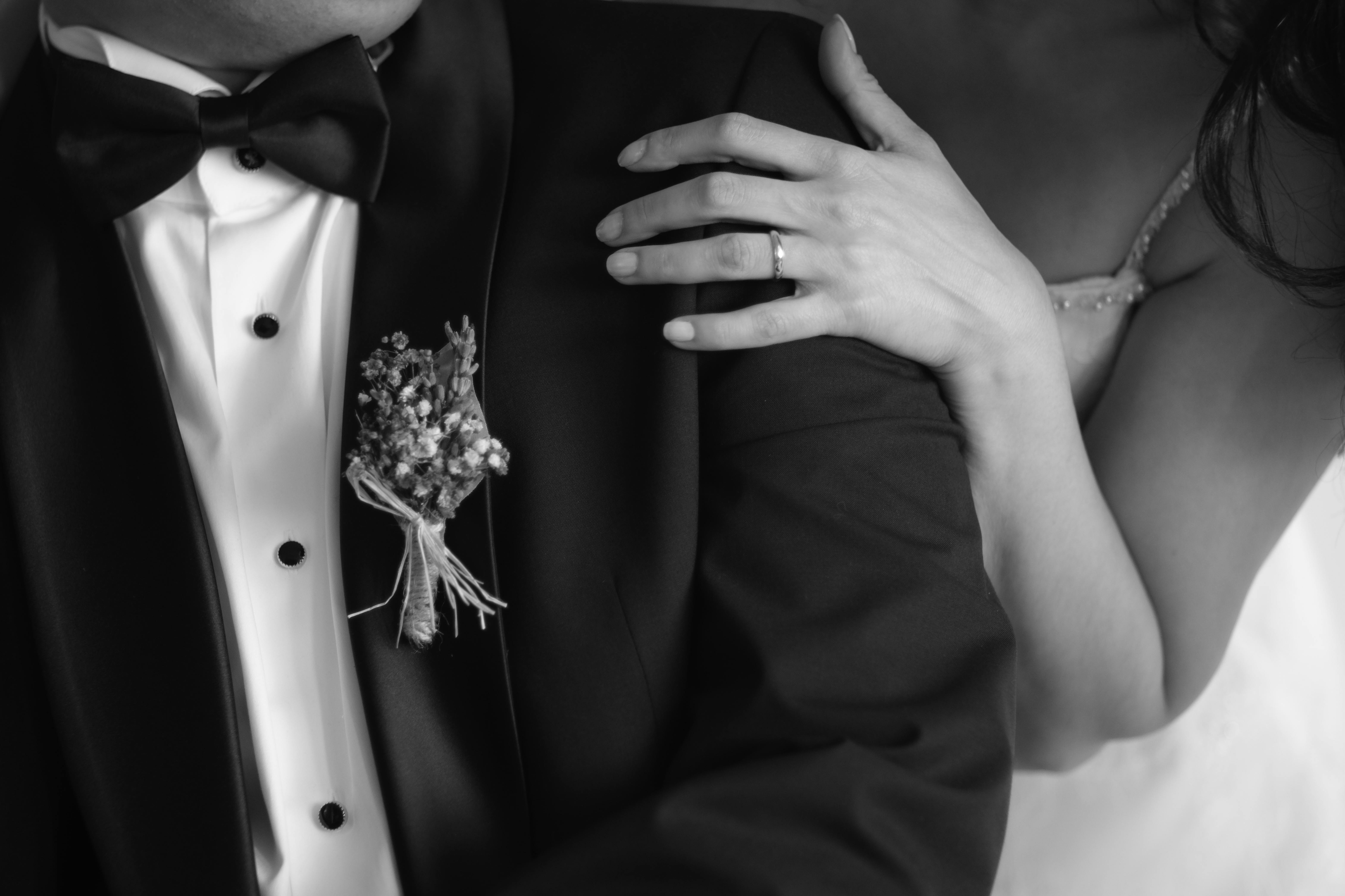 Man Touching Womans Hand Resting on Thigh · Free Stock Photo