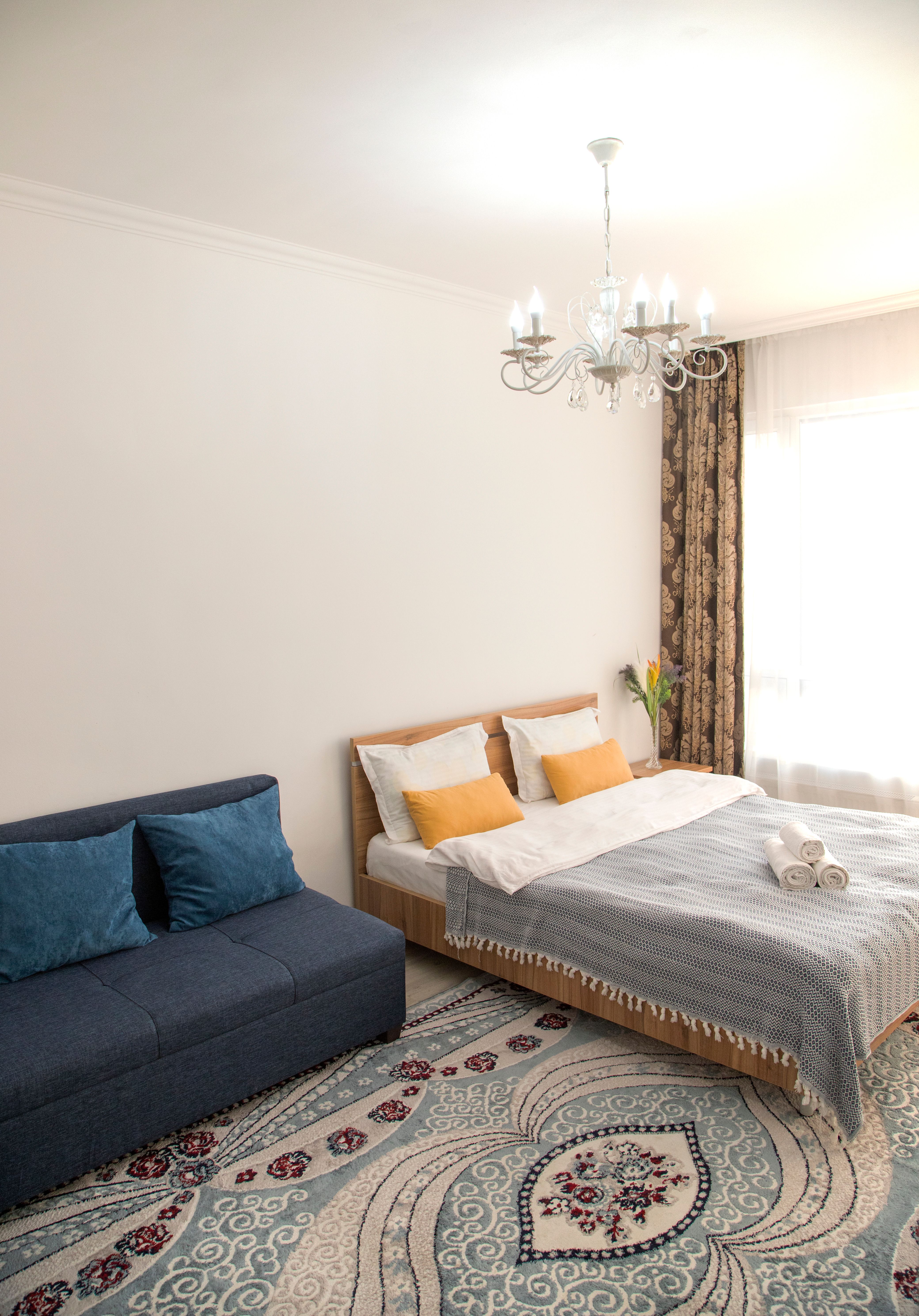 Photo of Sofa Beside a Bed · Free Stock Photo