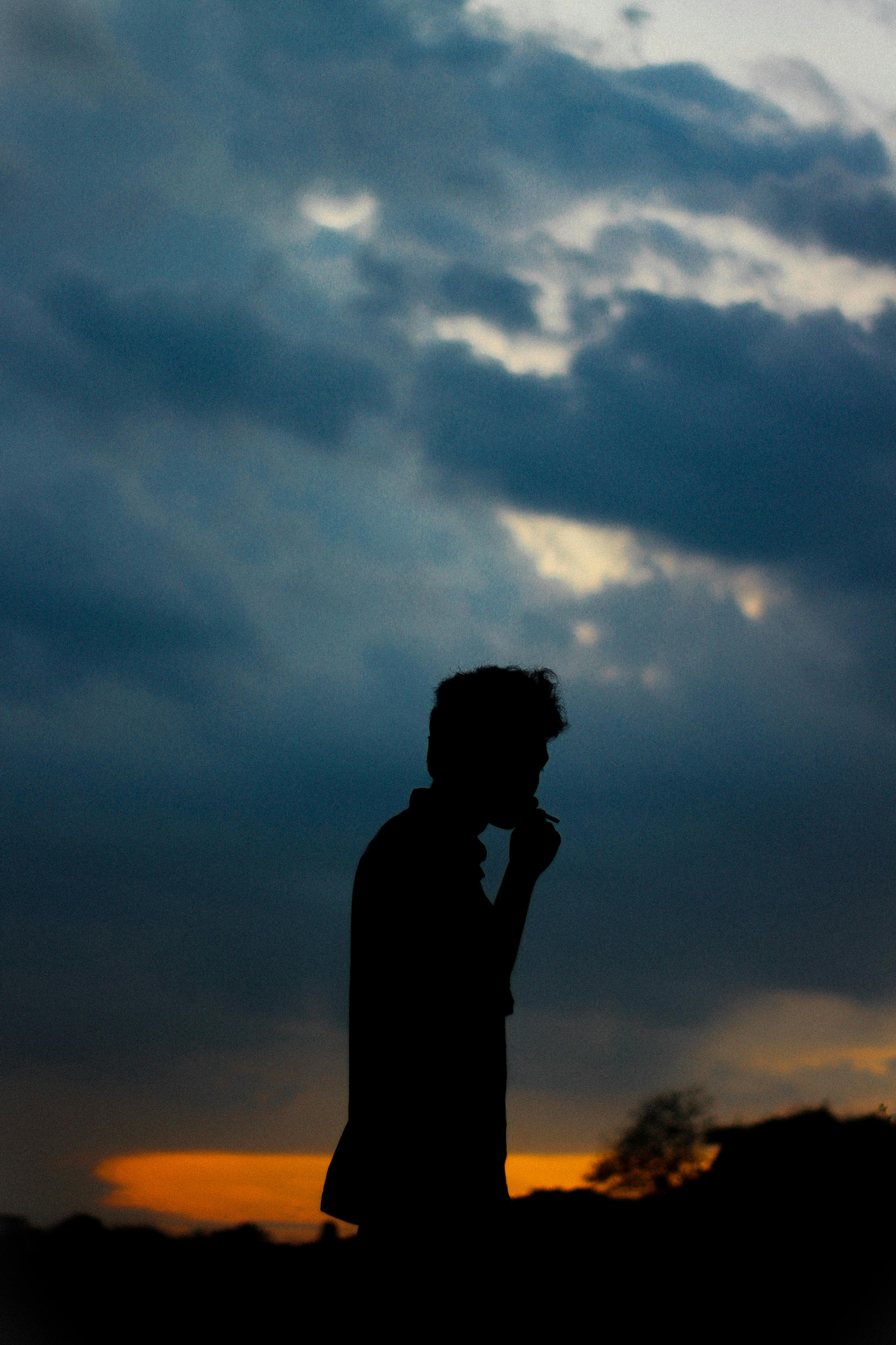 Silhouette of Human With Sunset Background · Free Stock Photo