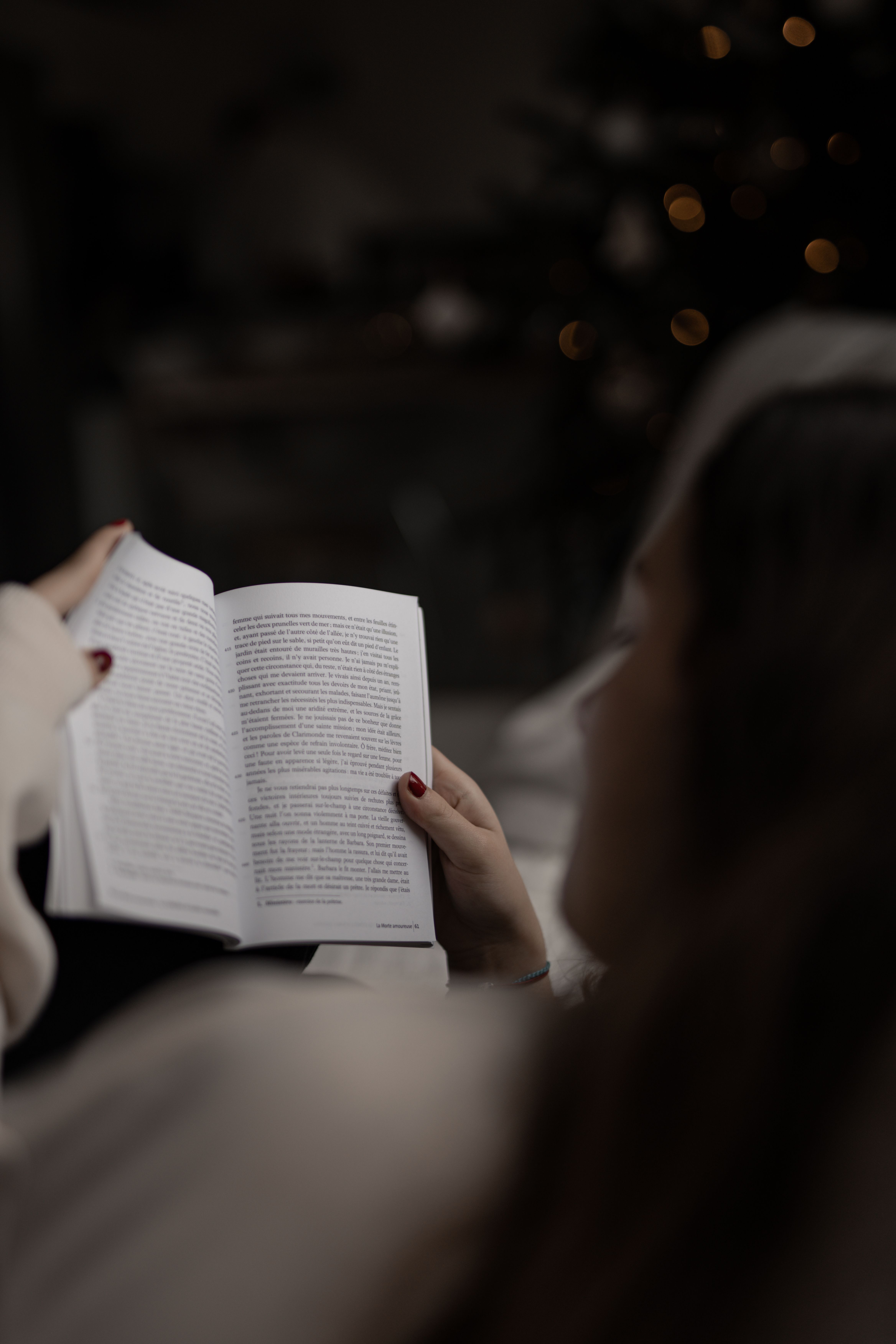 Close Up Photo of Woman Reading a Book · Free Stock Photo