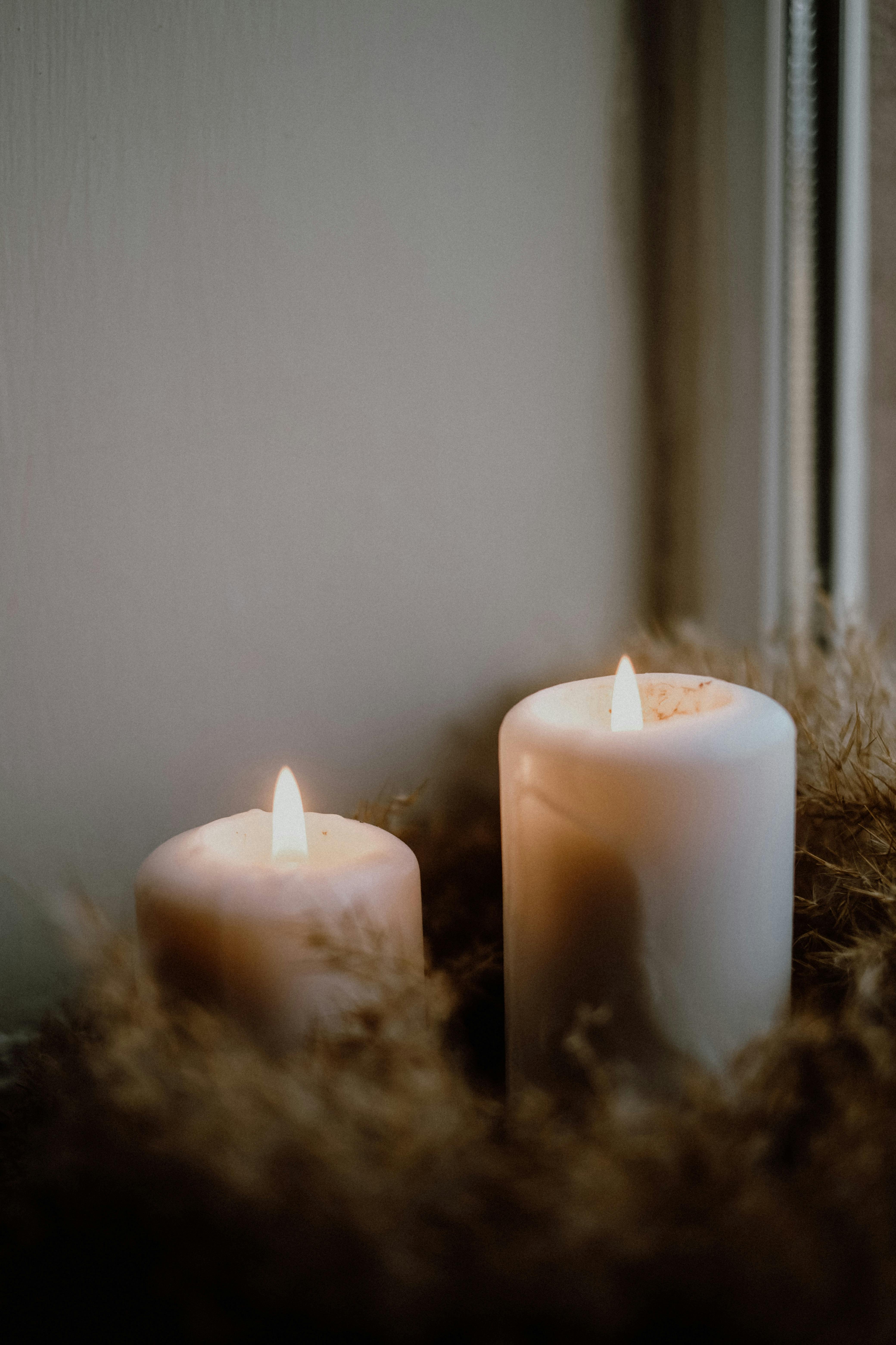 A Candle and Flowers · Free Stock Photo