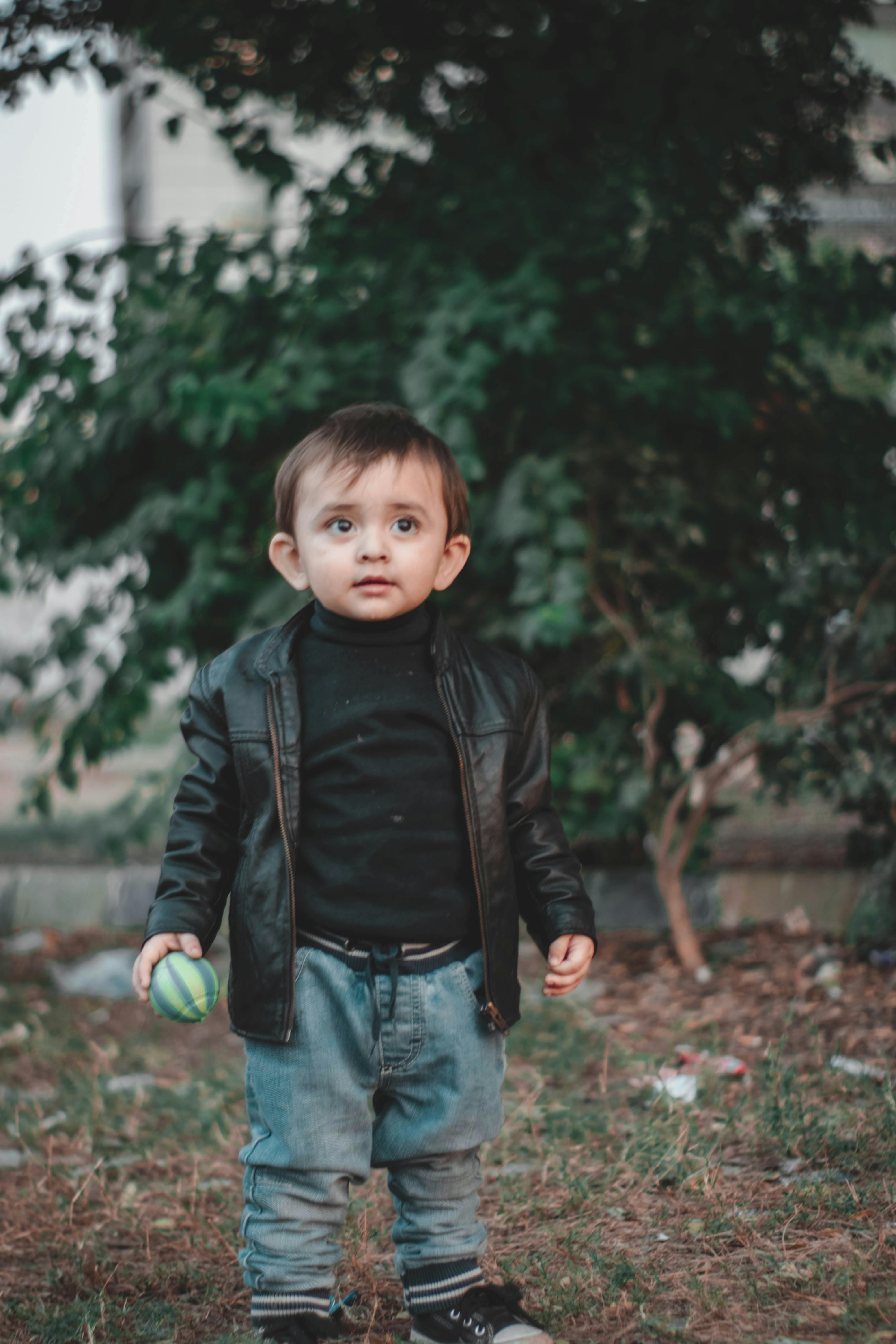 Boy Wearing a Leather Jacket · Free Stock Photo