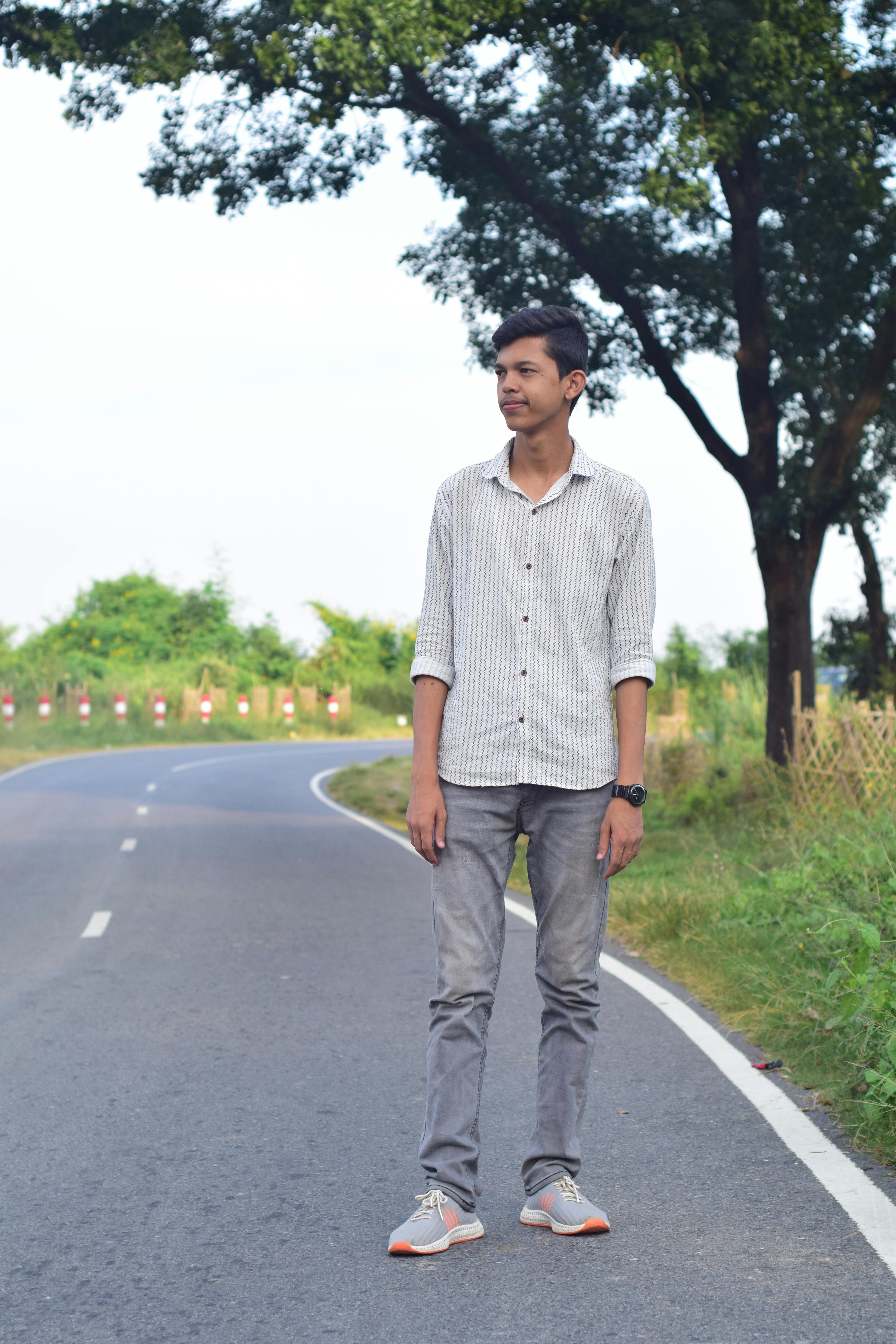Teenager Standing on the Road · Free Stock Photo