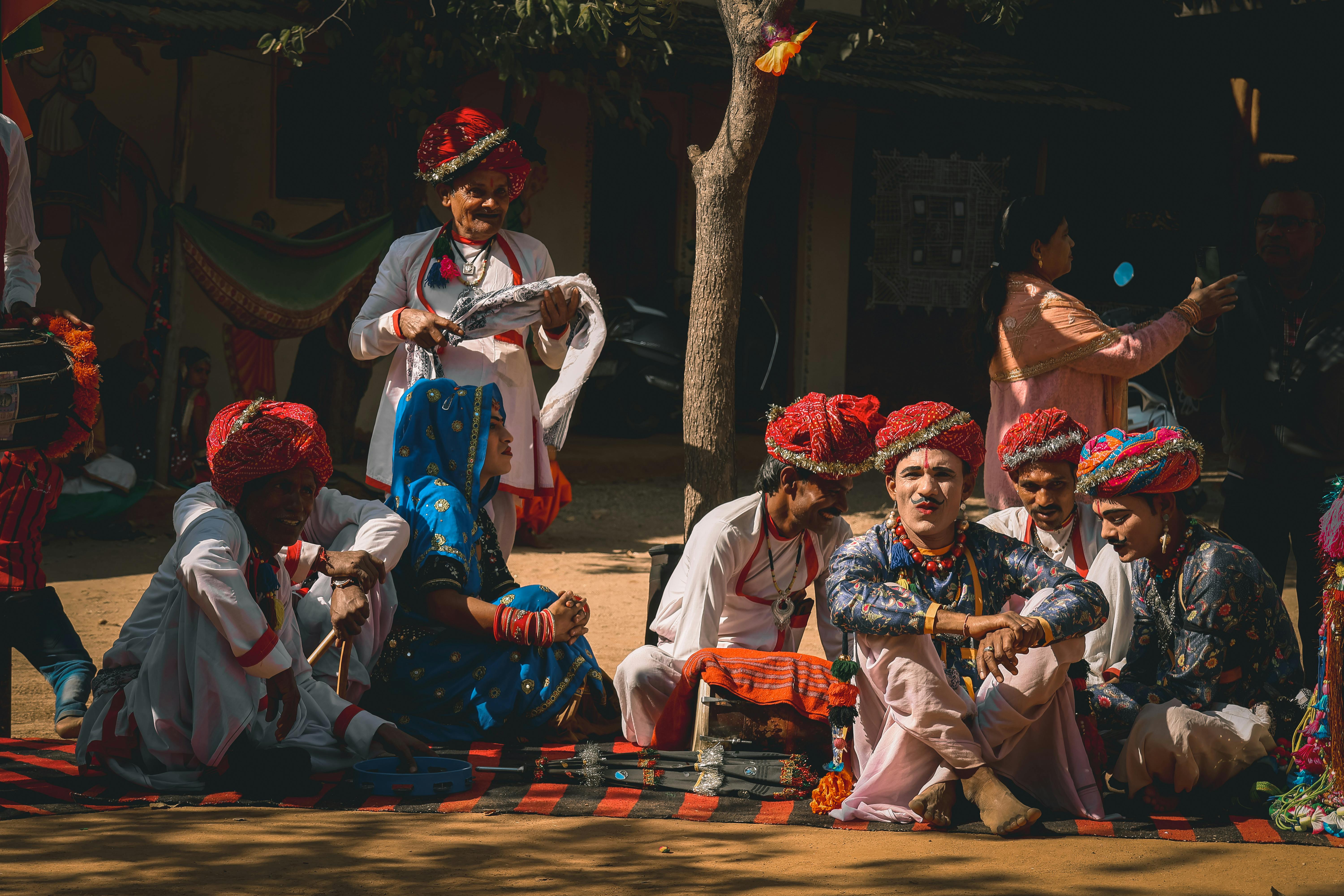 Women and Men in Traditional Clothing in Village · Free Stock Photo