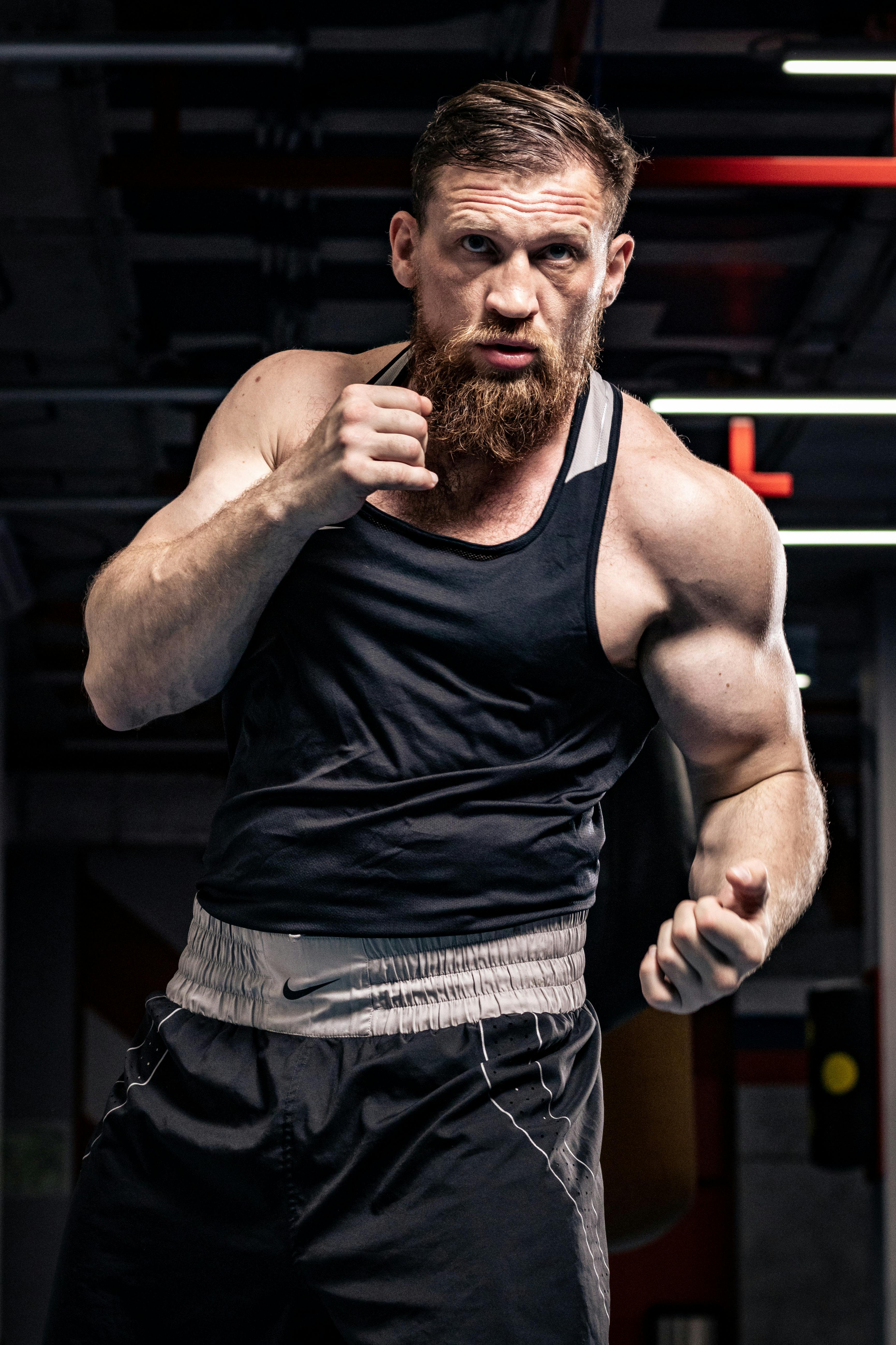 Athlete Man in a Fighting Pose · Free Stock Photo