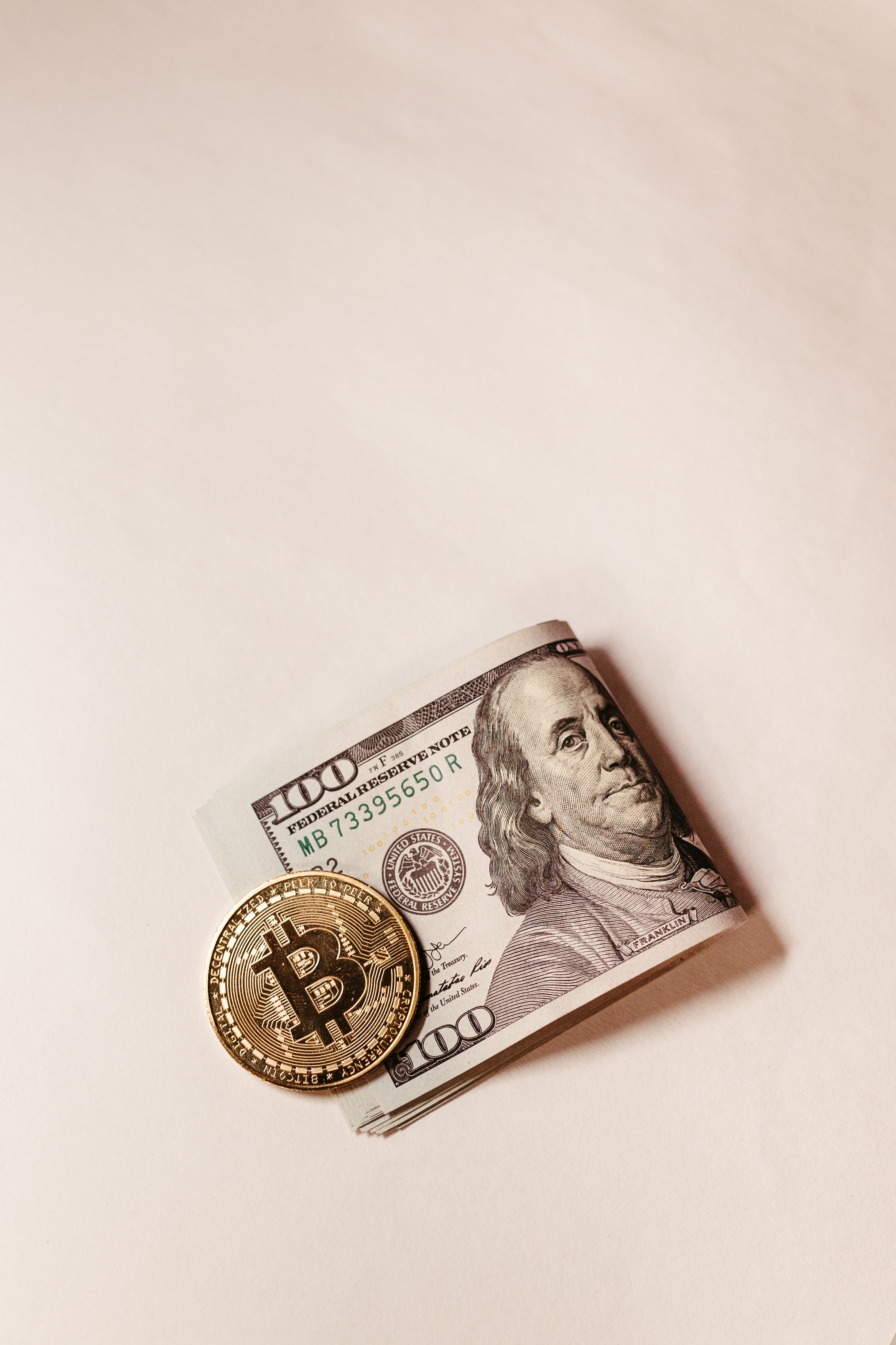 Person Holding Gold Round Coin · Free Stock Photo