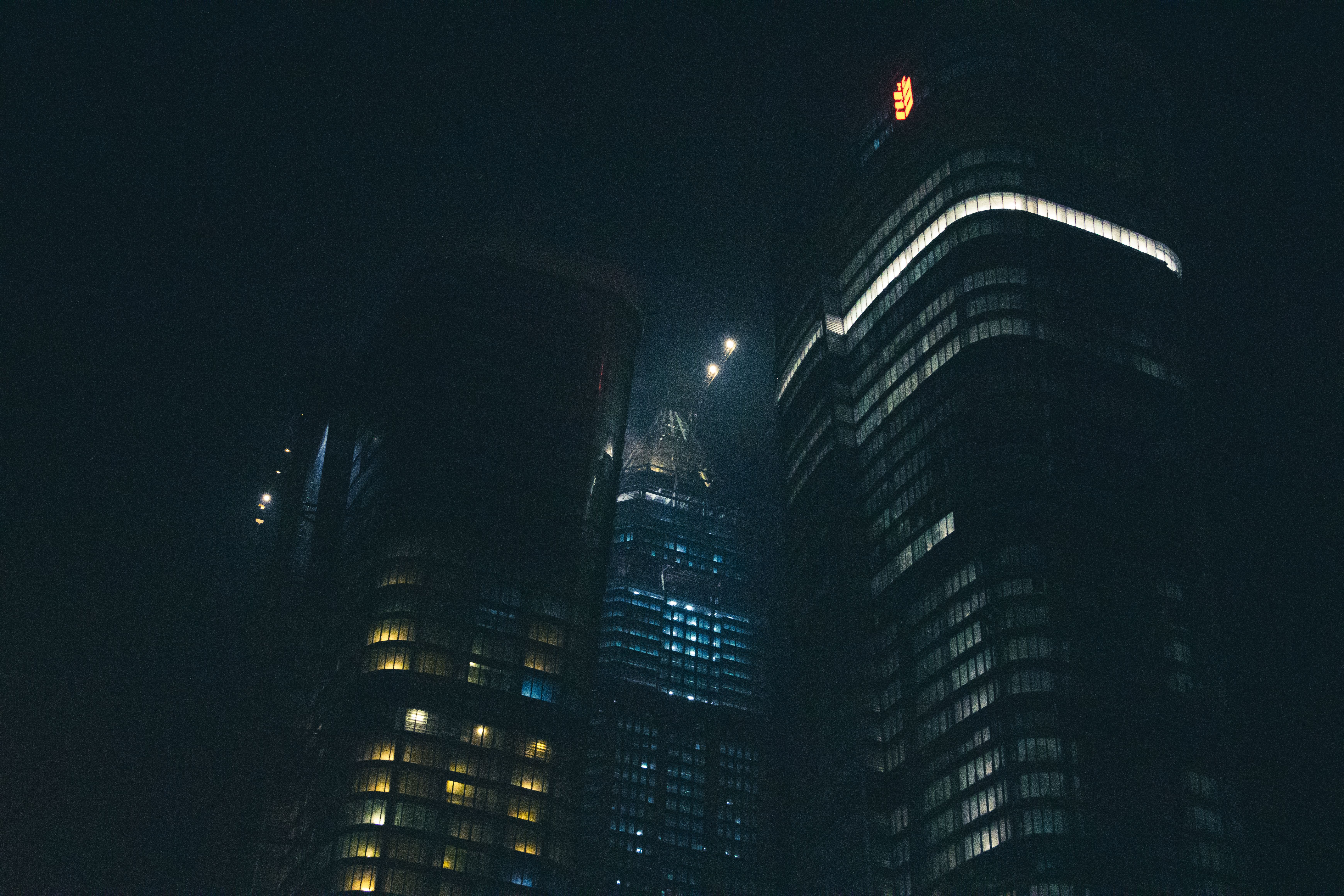 Low-Angle Shot of High Rise Buildings in the City during Nighttime ...