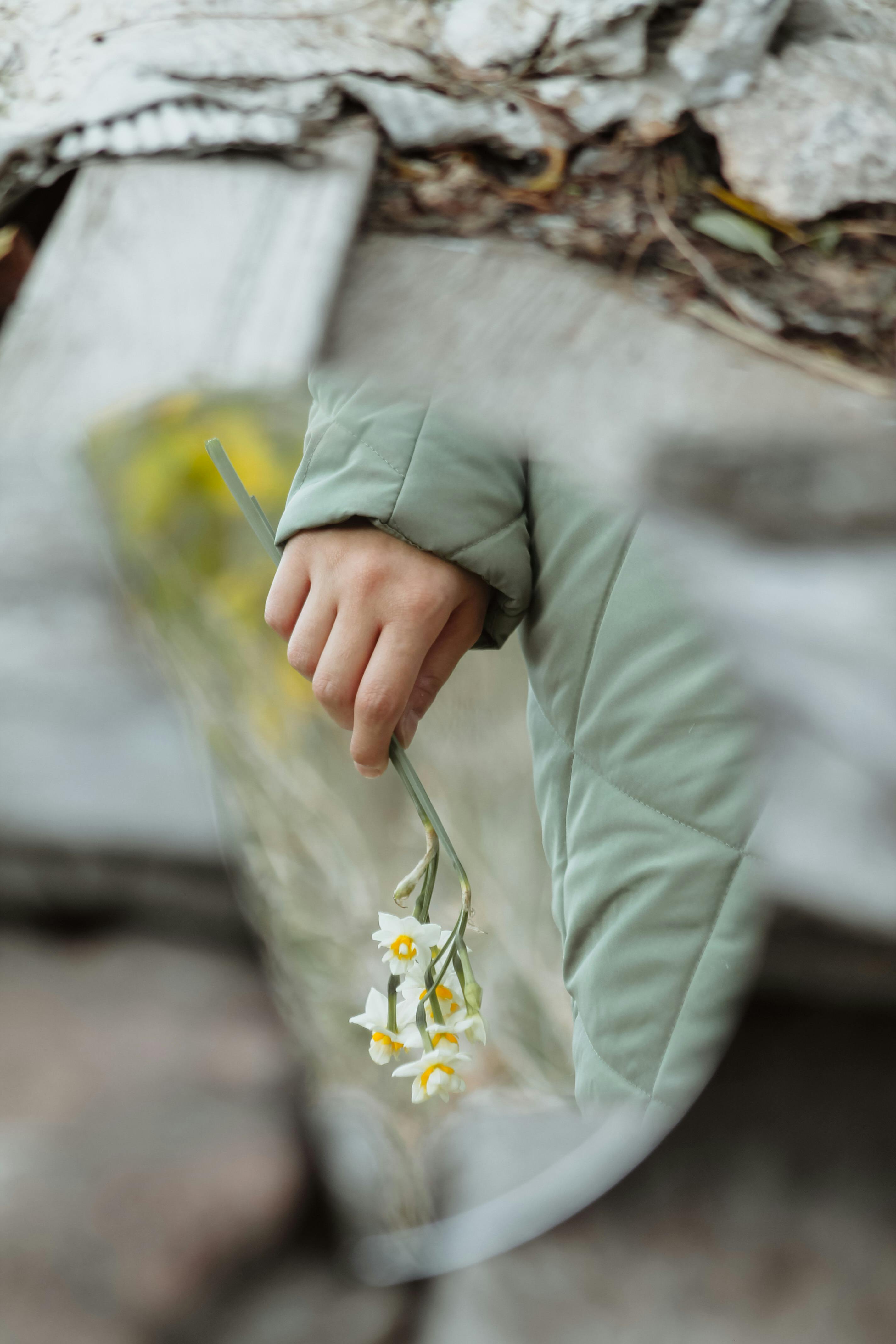 White Petaled Flower Reflection From Small Round Mirror · Free Stock Photo