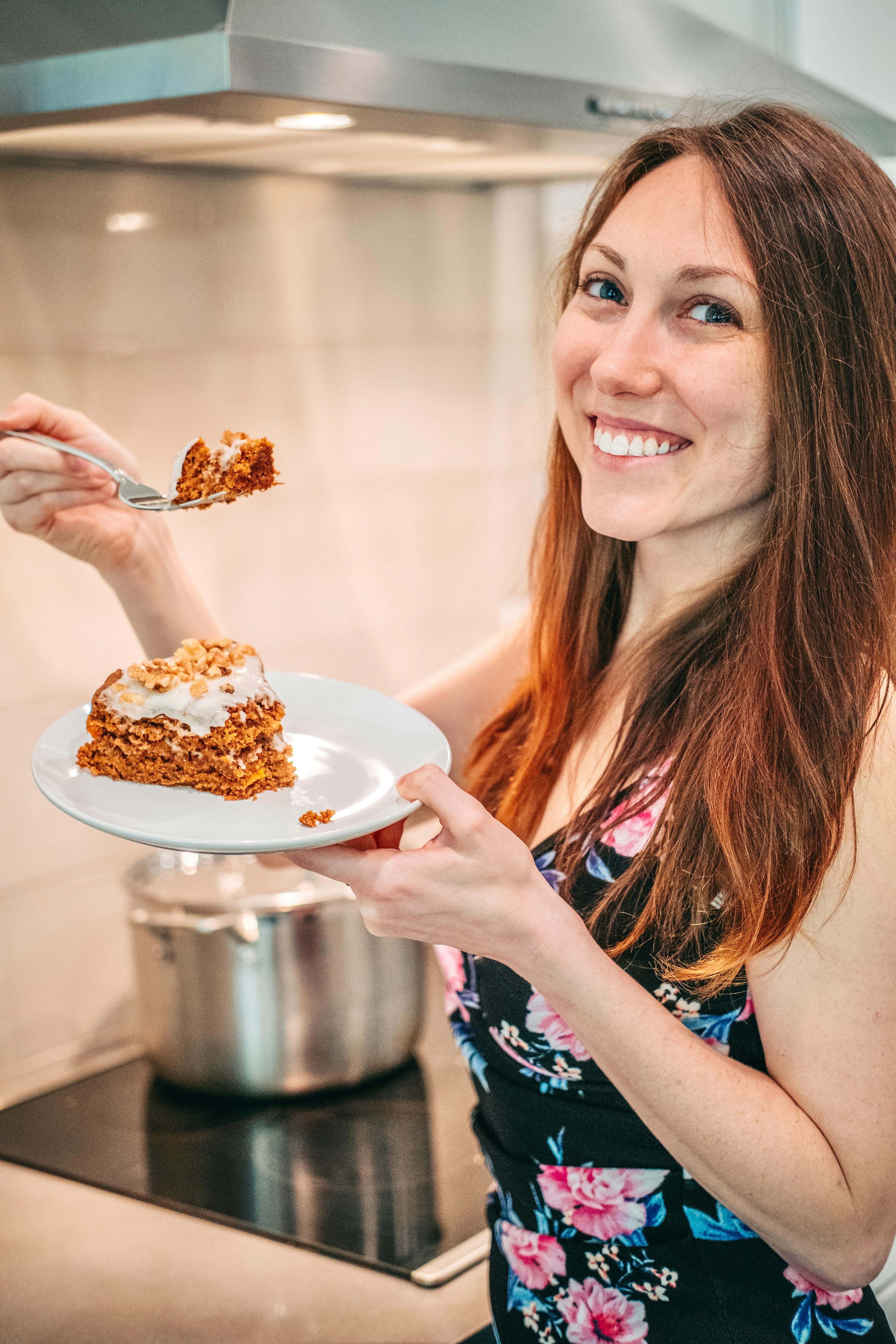 Smiling Woman with Cake · Free Stock Photo