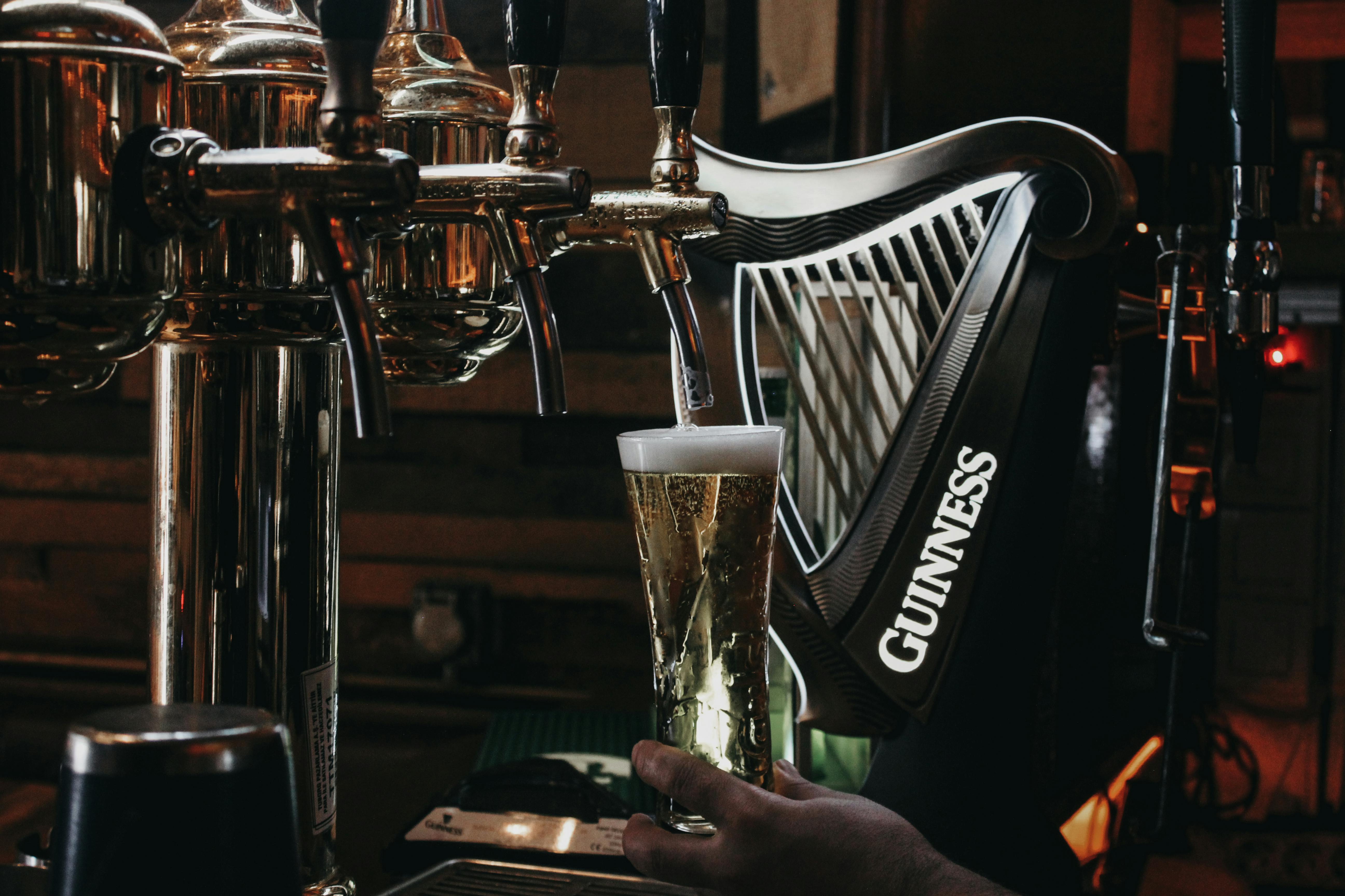 Guinness Beer Tap on the Table · Free Stock Photo