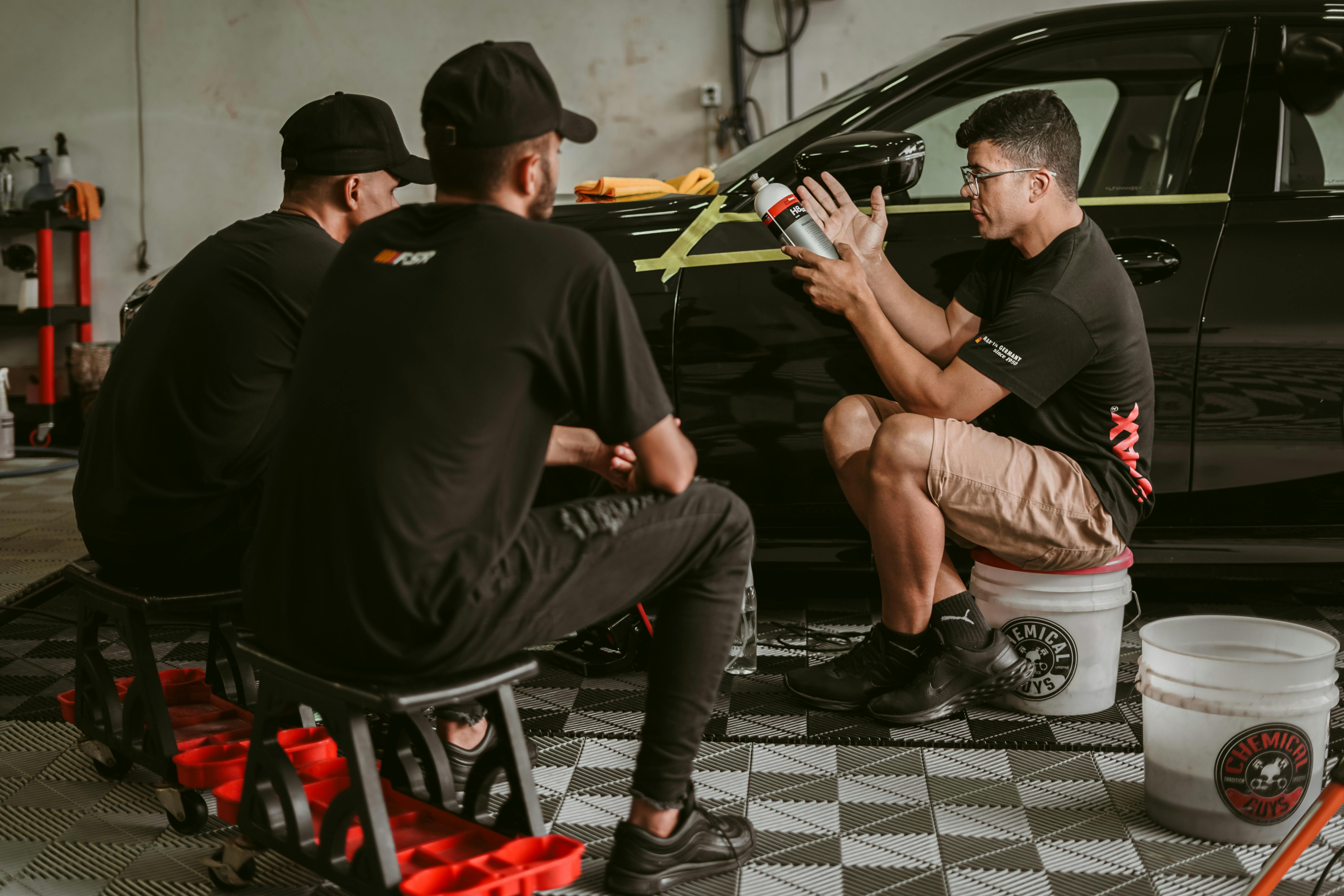 Men Working with Car Tuning in Garage · Free Stock Photo
