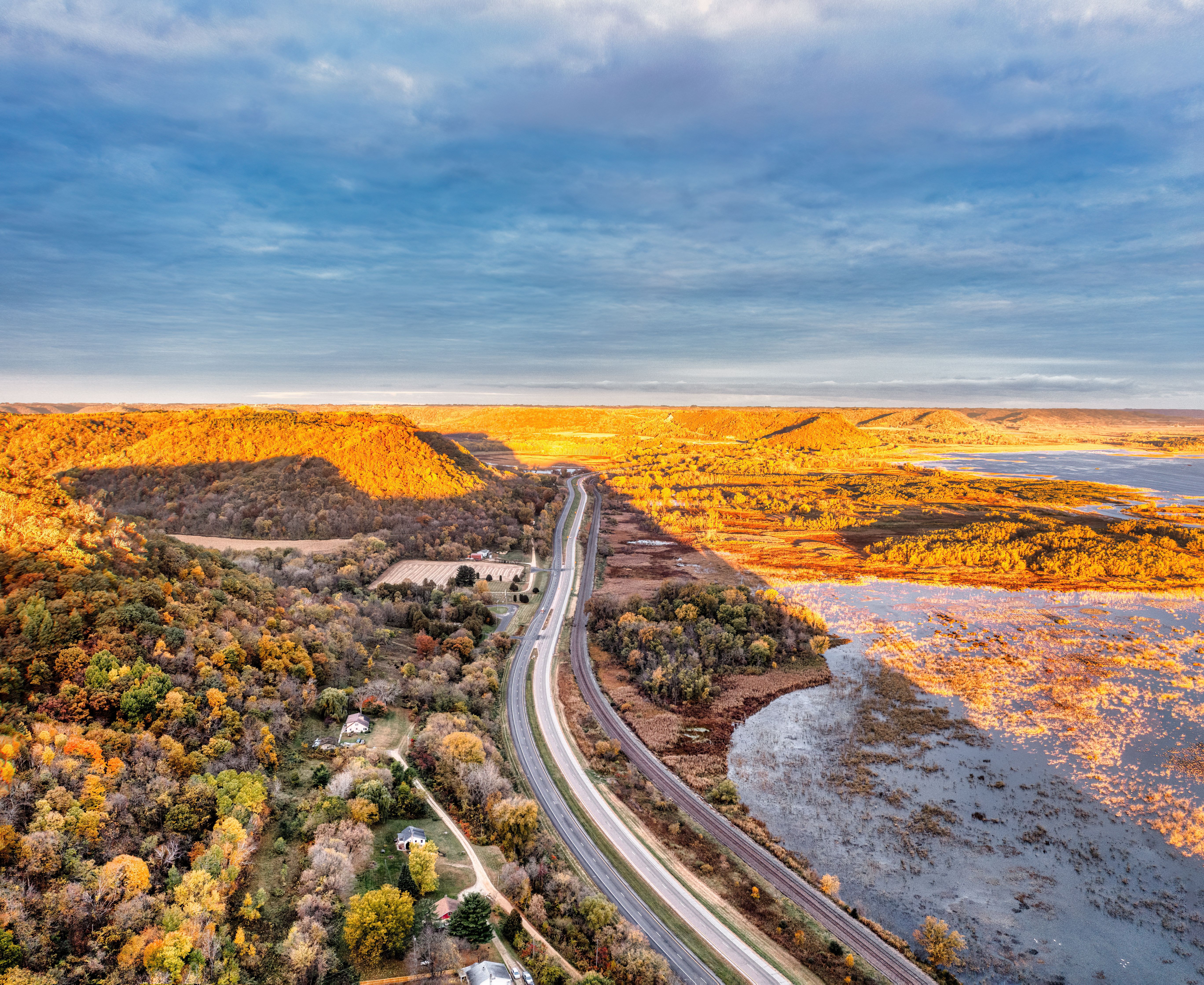 Aerial View of a Countryside Highway Stretching Through an Autumn ...