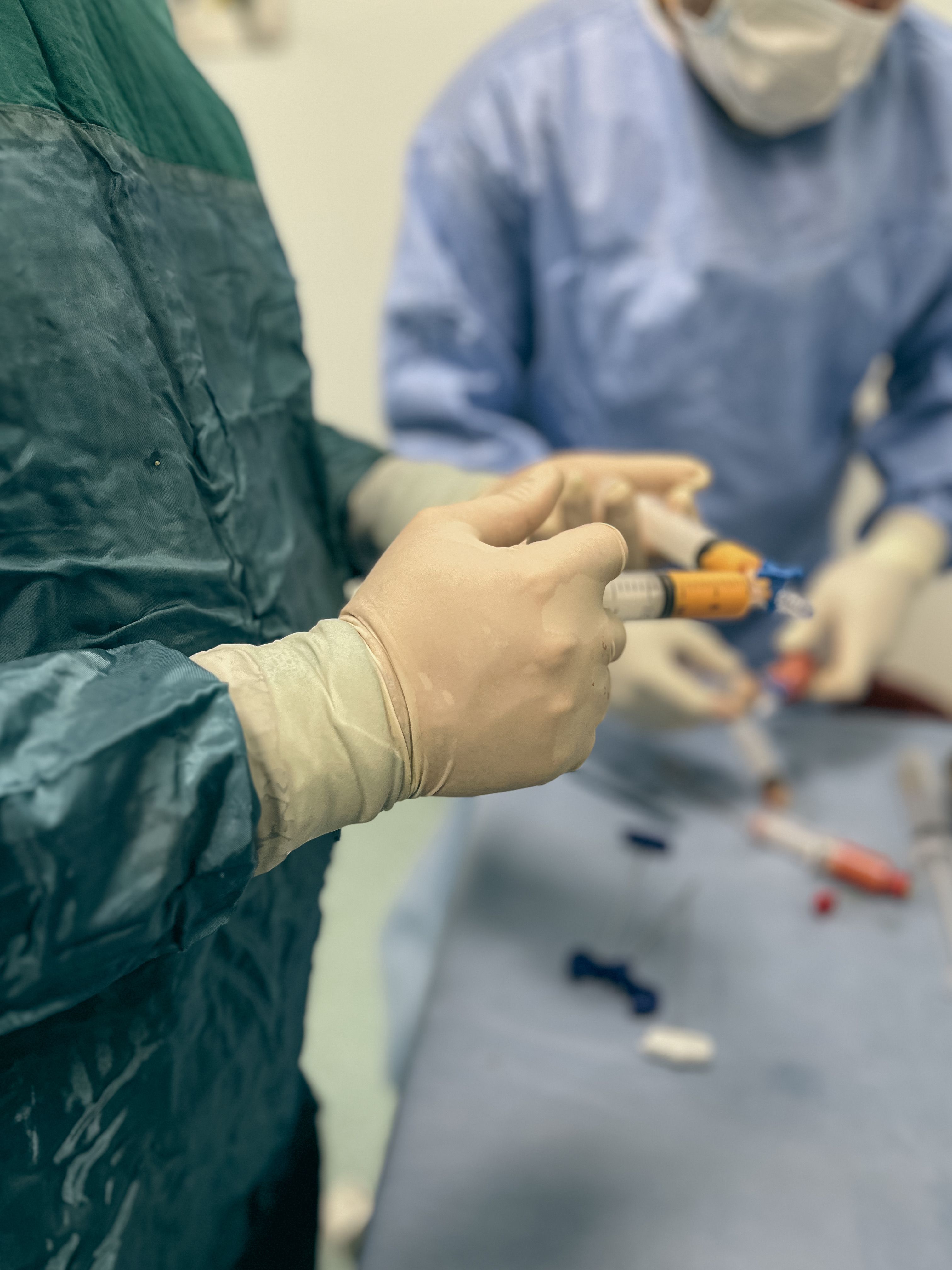 Surgeons Operating on a Patient · Free Stock Photo
