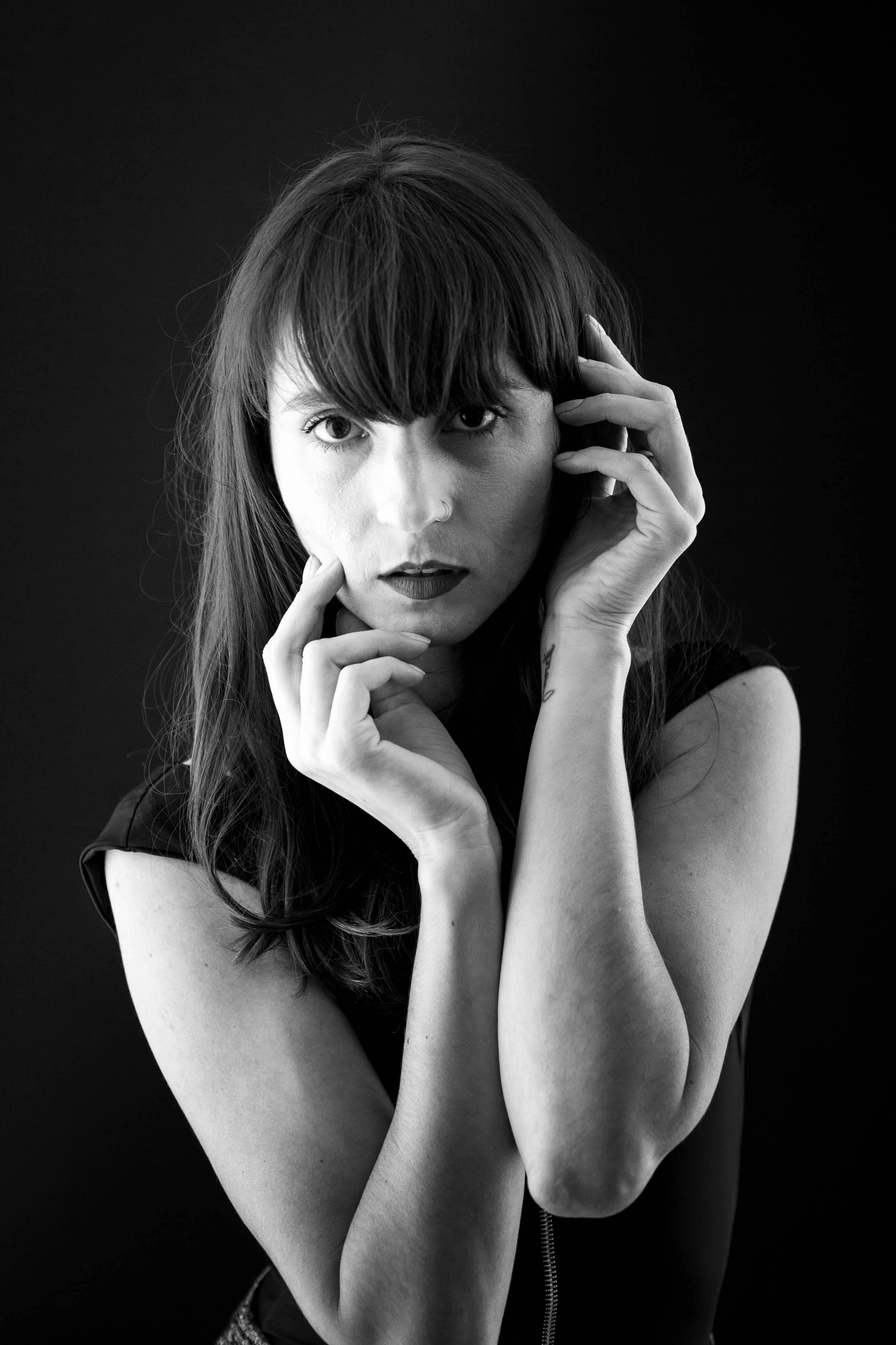 Monochrome Photo of Woman with her Head Up · Free Stock Photo