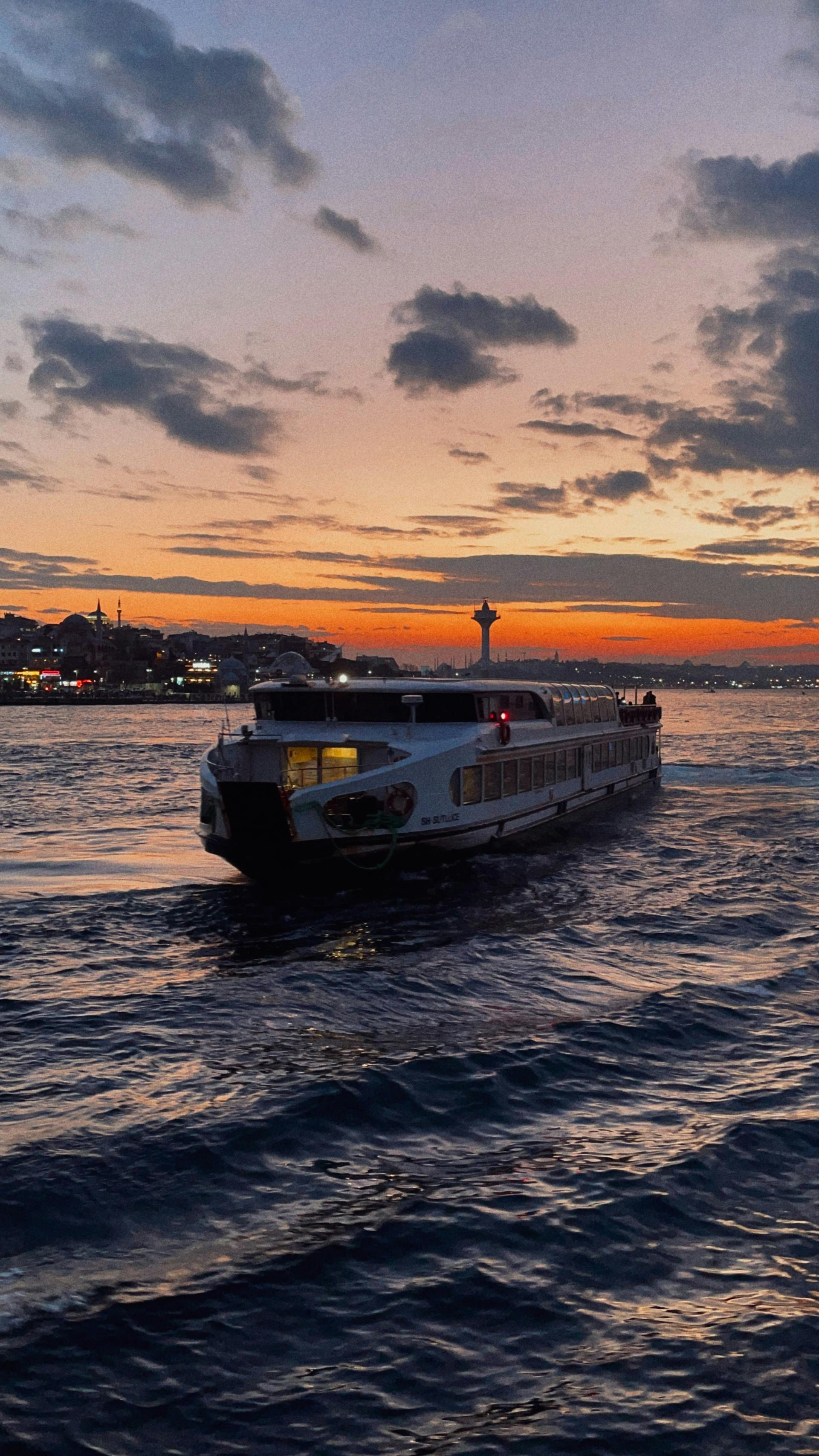 Ferries on the Ocean during Sunset · Free Stock Photo