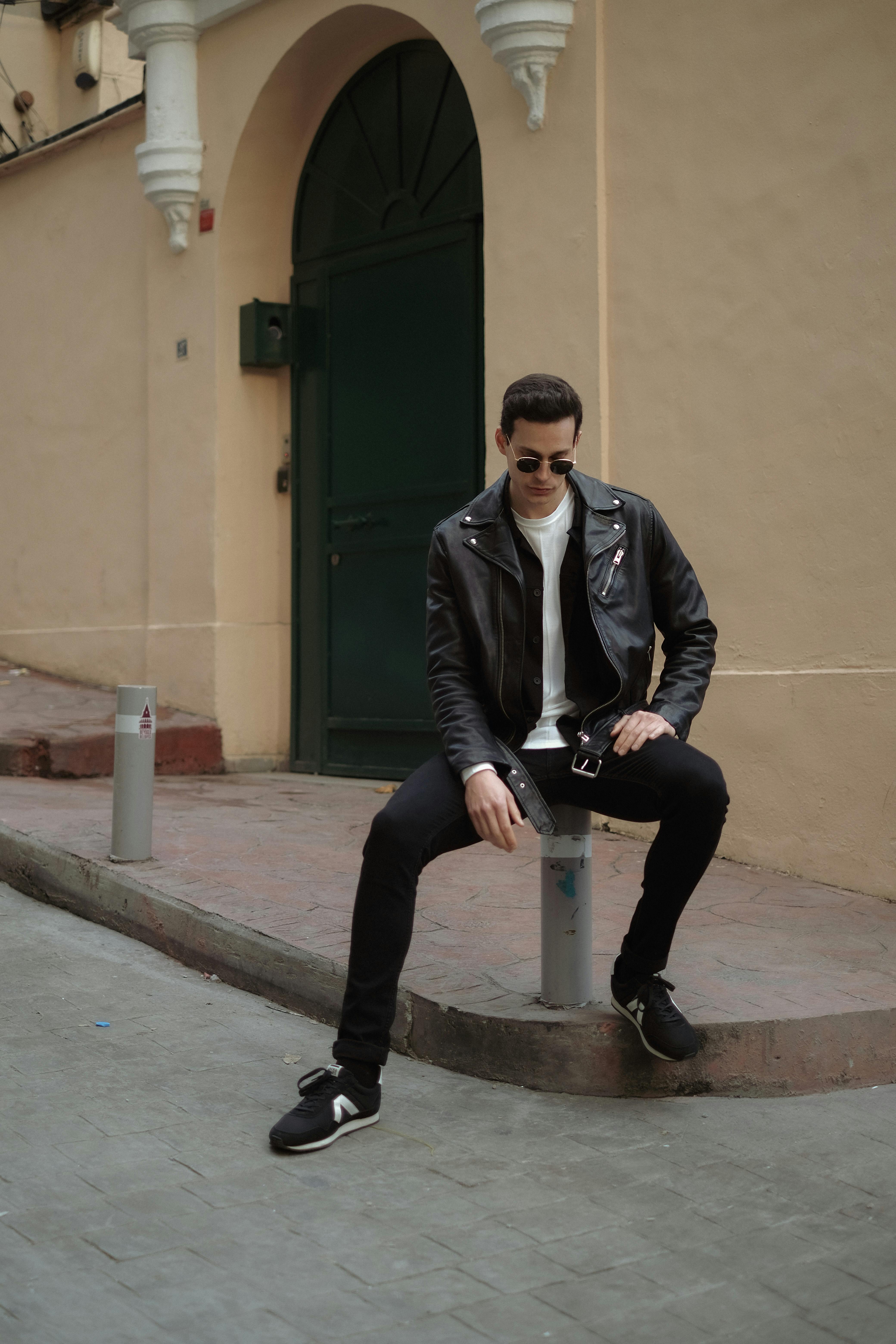 Man Wearing Leather Jacket on City Street · Free Stock Photo