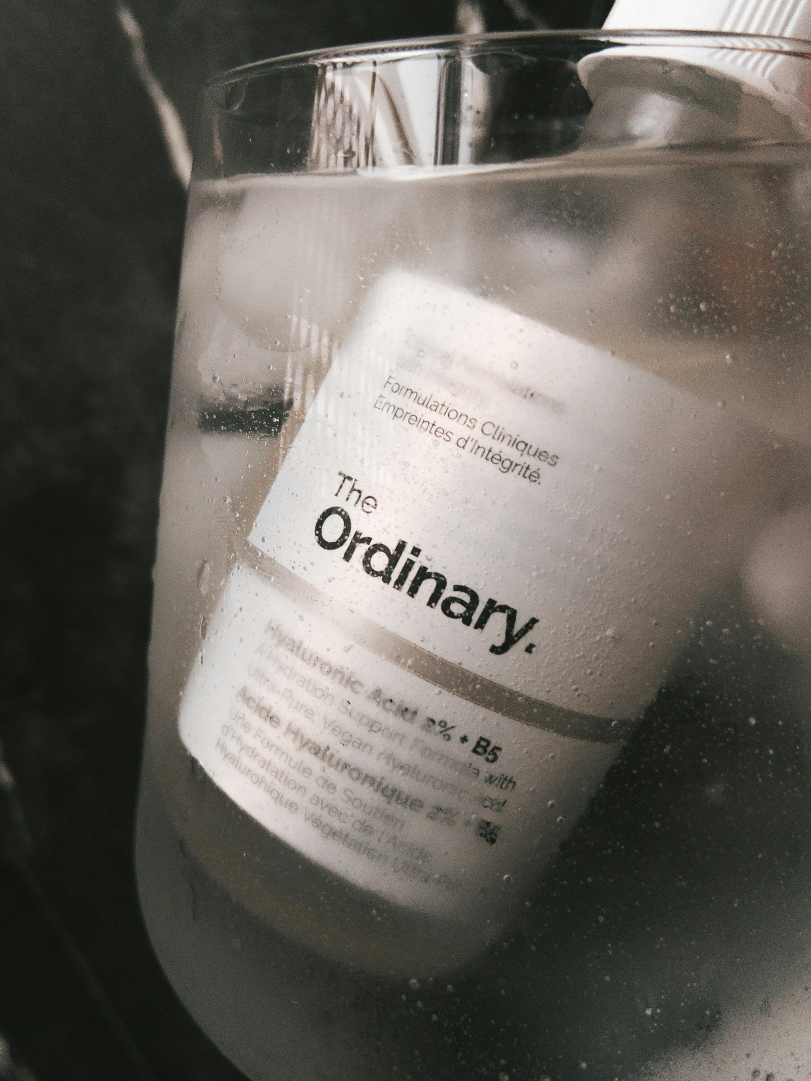 Dropper Bottle of The Ordinary Hyaluronic Acid 2 + B5 in a Glass of ...