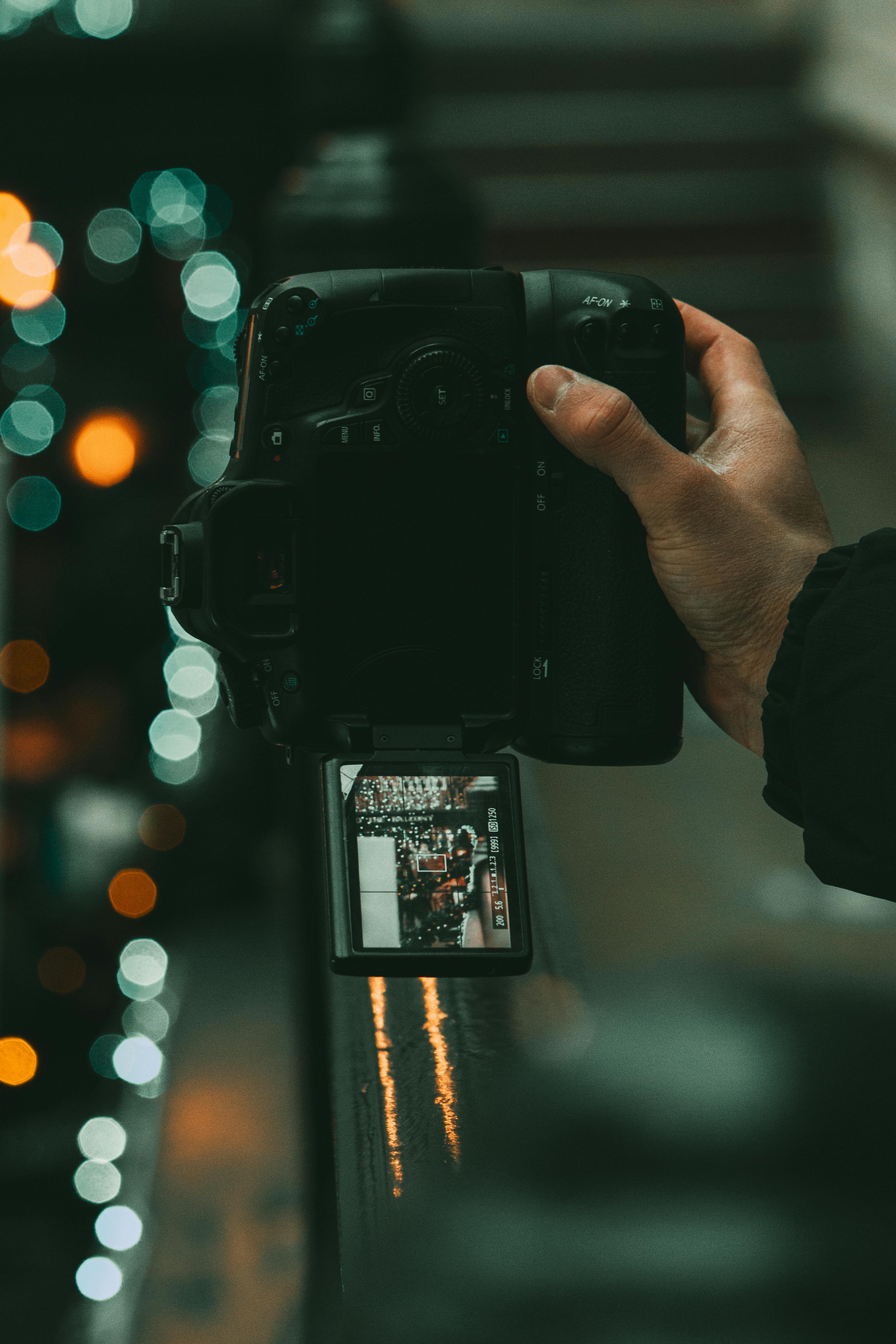 Hand Holding Camera · Free Stock Photo