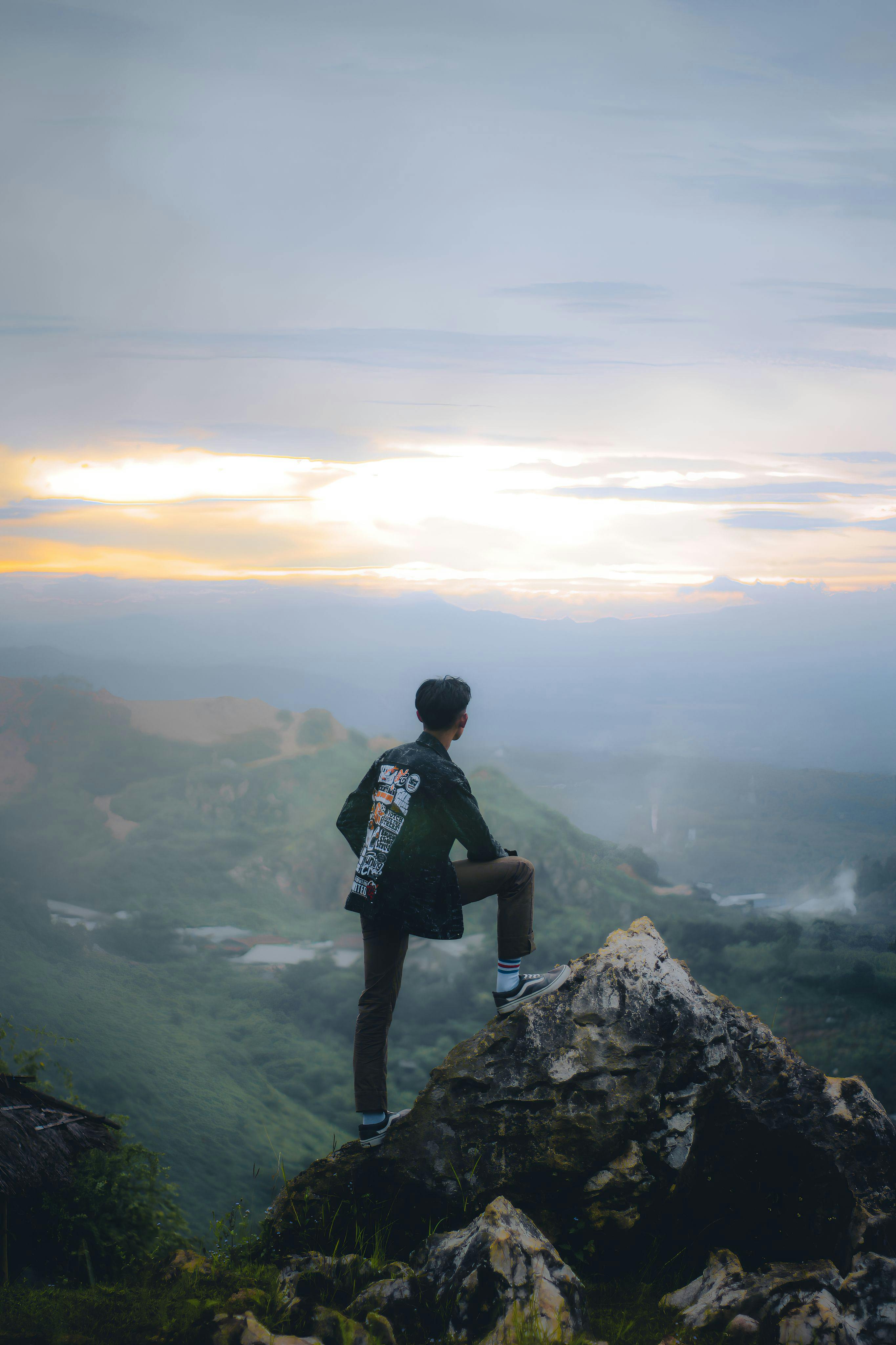 Photo of a Person Standing in Mountain · Free Stock Photo