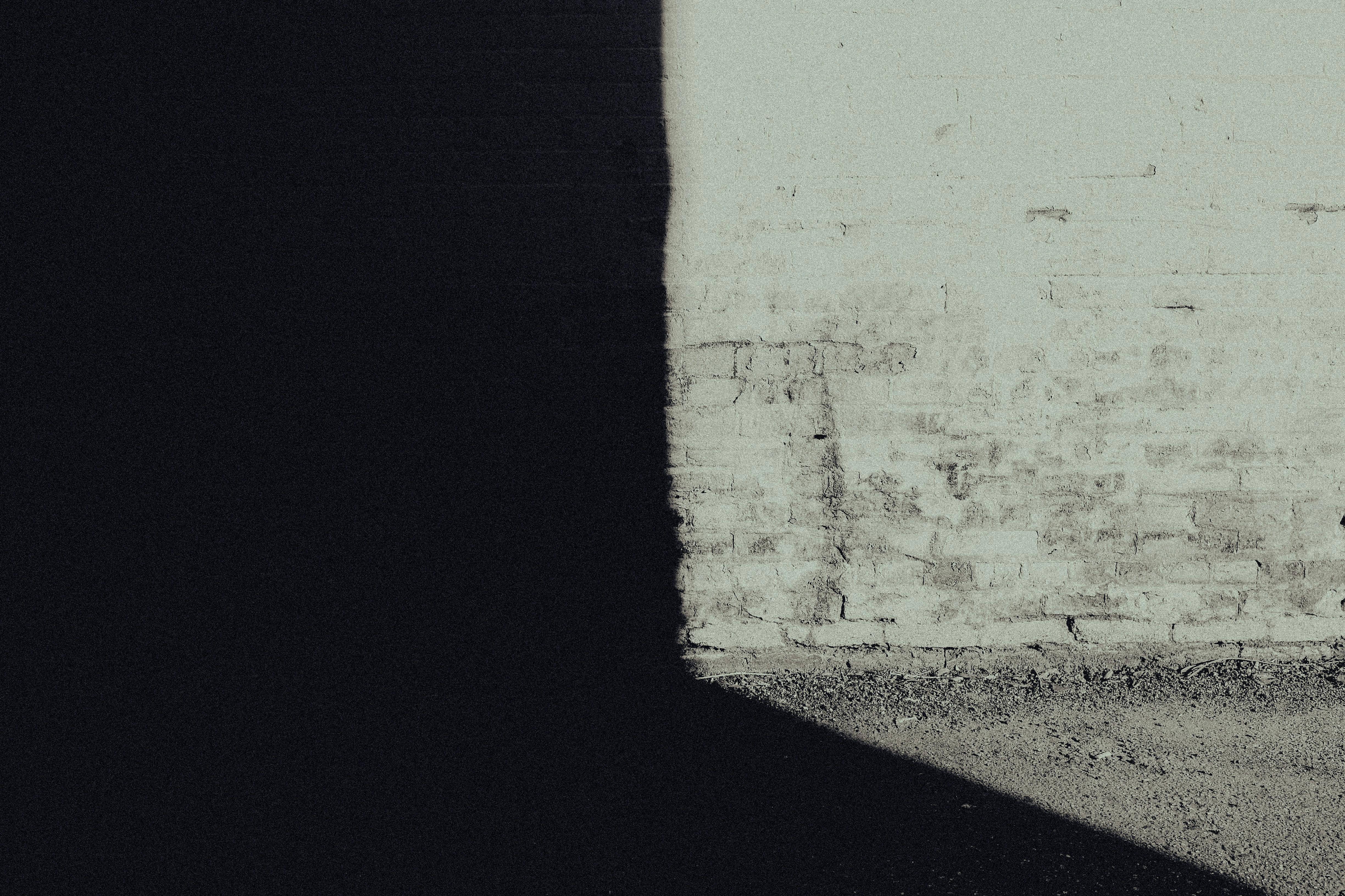 Light and Shadow on Brick Wall · Free Stock Photo