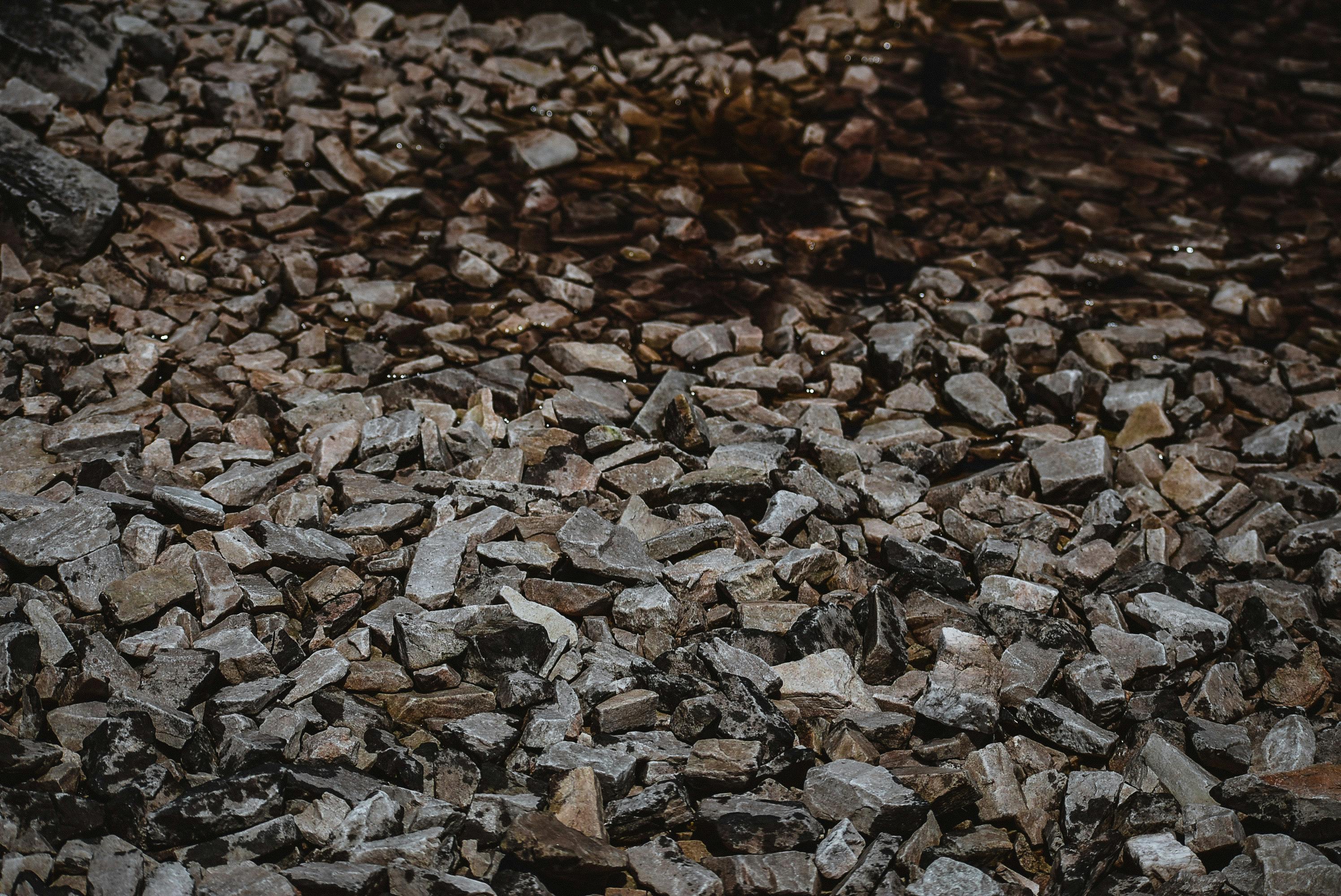Broken Rocks on Ground · Free Stock Photo