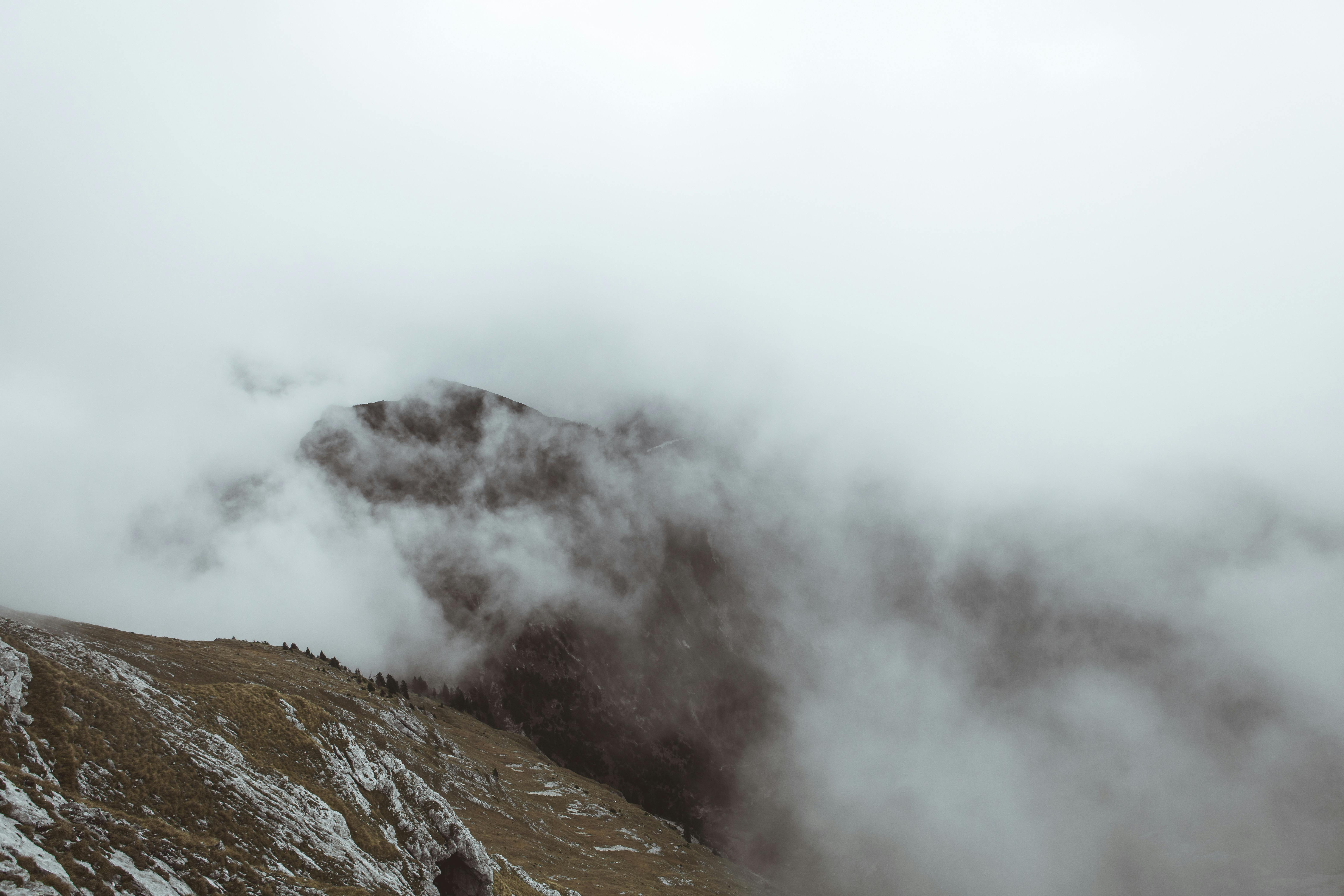 Thick Clouds Obscuring Mountain Peak · Free Stock Photo