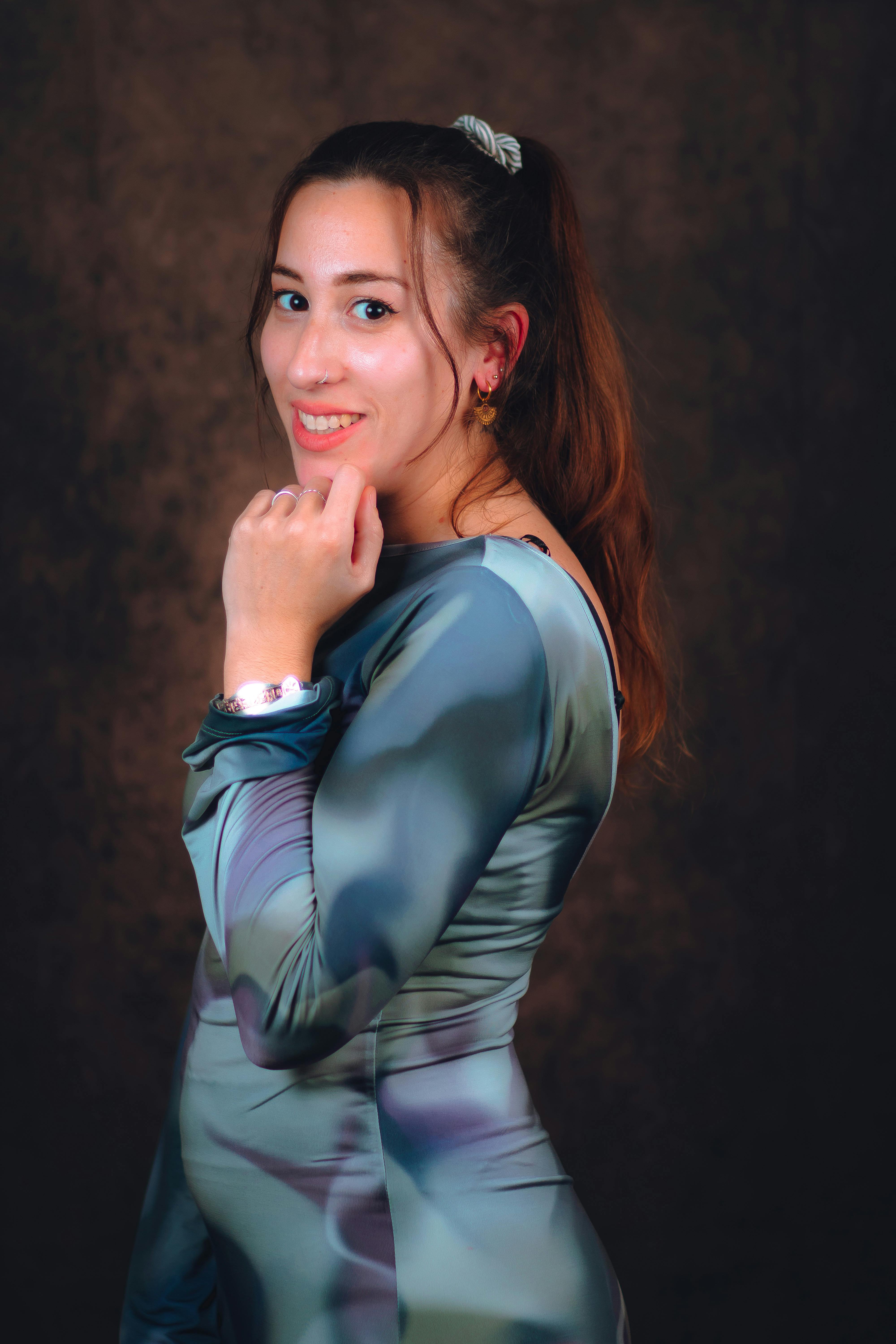 A Woman in Blue Long Sleeve Dress · Free Stock Photo