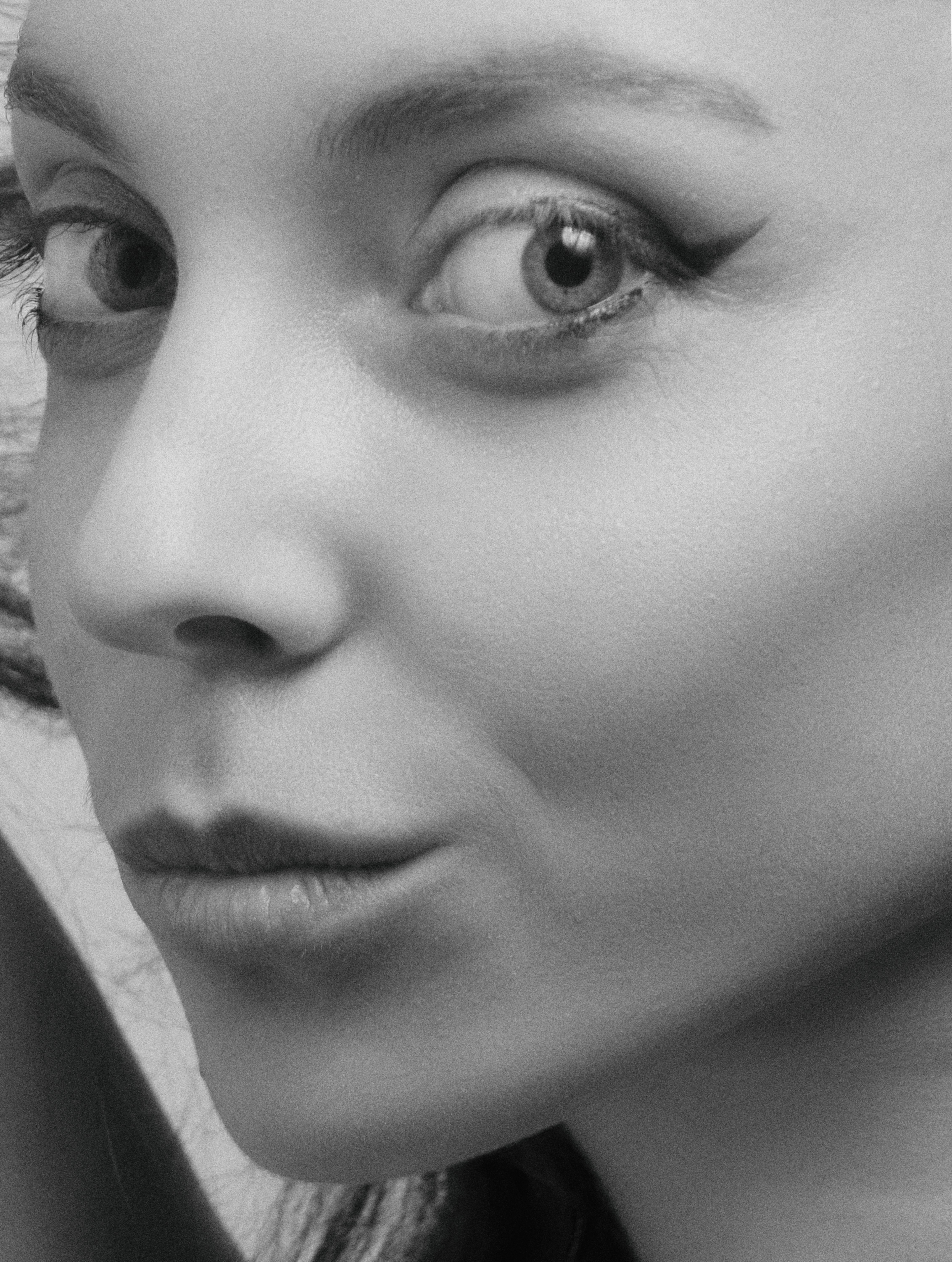 Grayscale Photo of a Woman's Face · Free Stock Photo