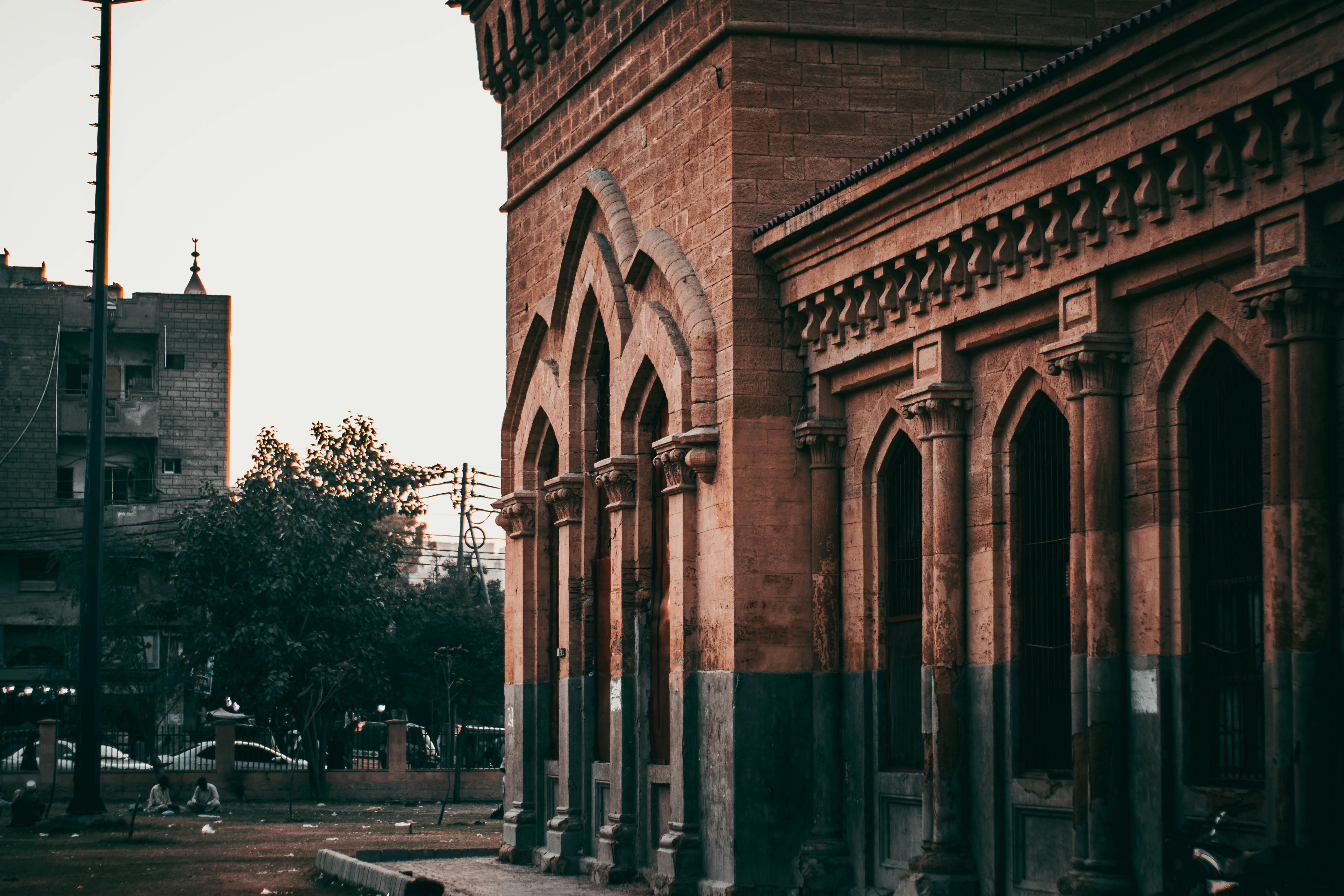 Walkway Through Gate into City Street · Free Stock Photo