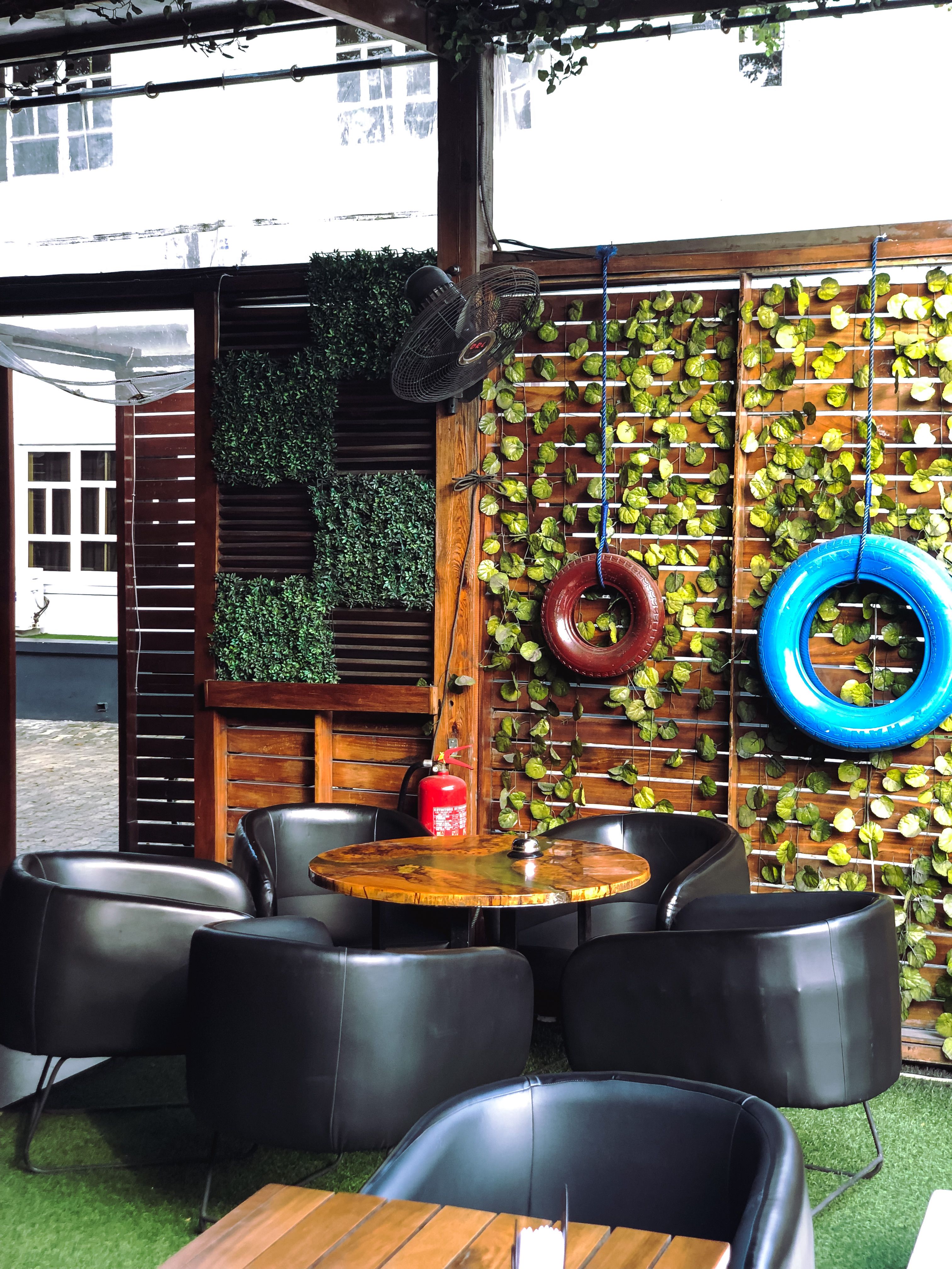 Wooden Tables and Chairs in a Modern Restaurant · Free Stock Photo