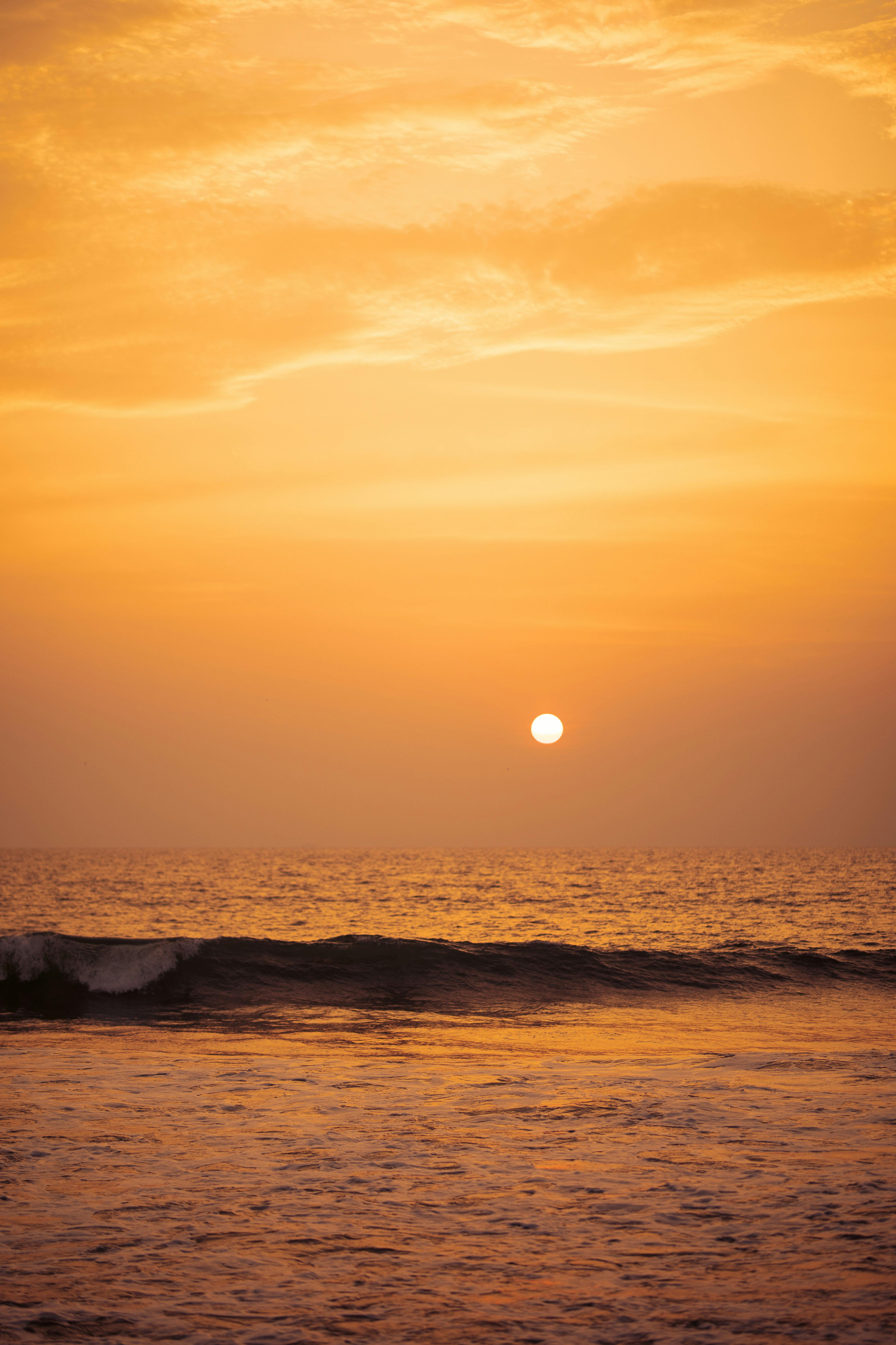 Sun over Beach at Sunset · Free Stock Photo