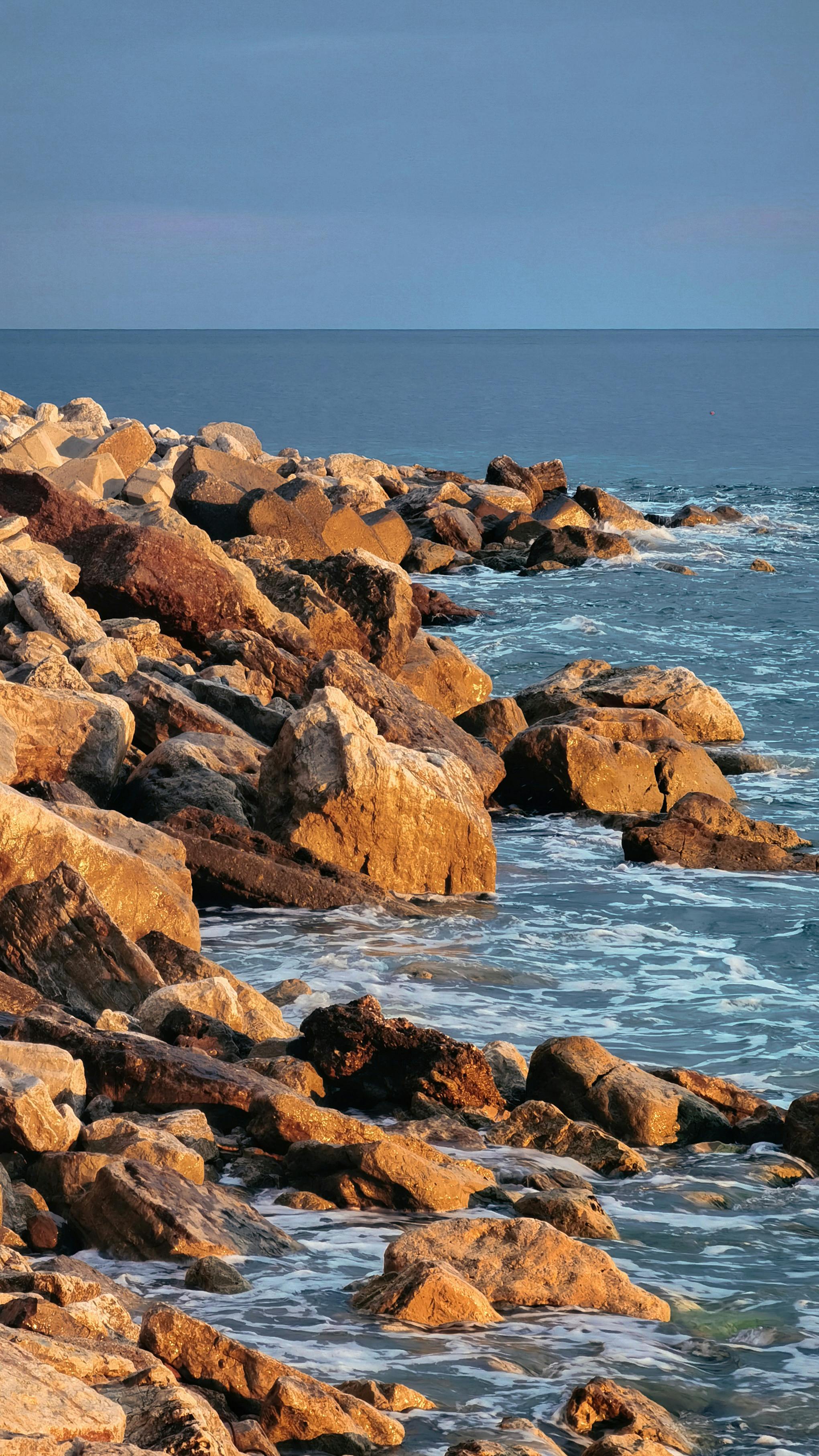 Spiky Rock at Sea · Free Stock Photo