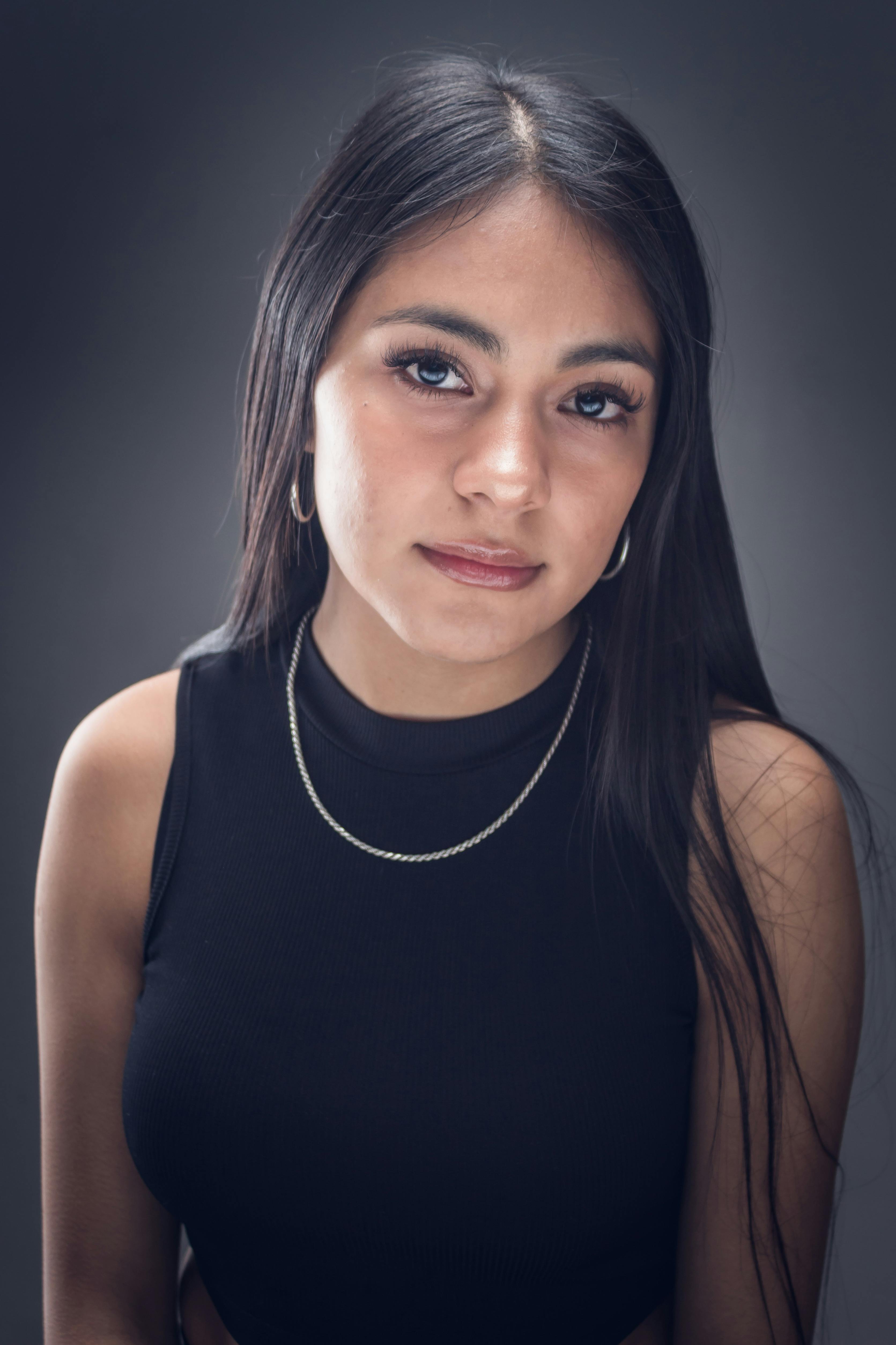 Partially Dressed Woman with Long Black Hair Making Step · Free Stock Photo