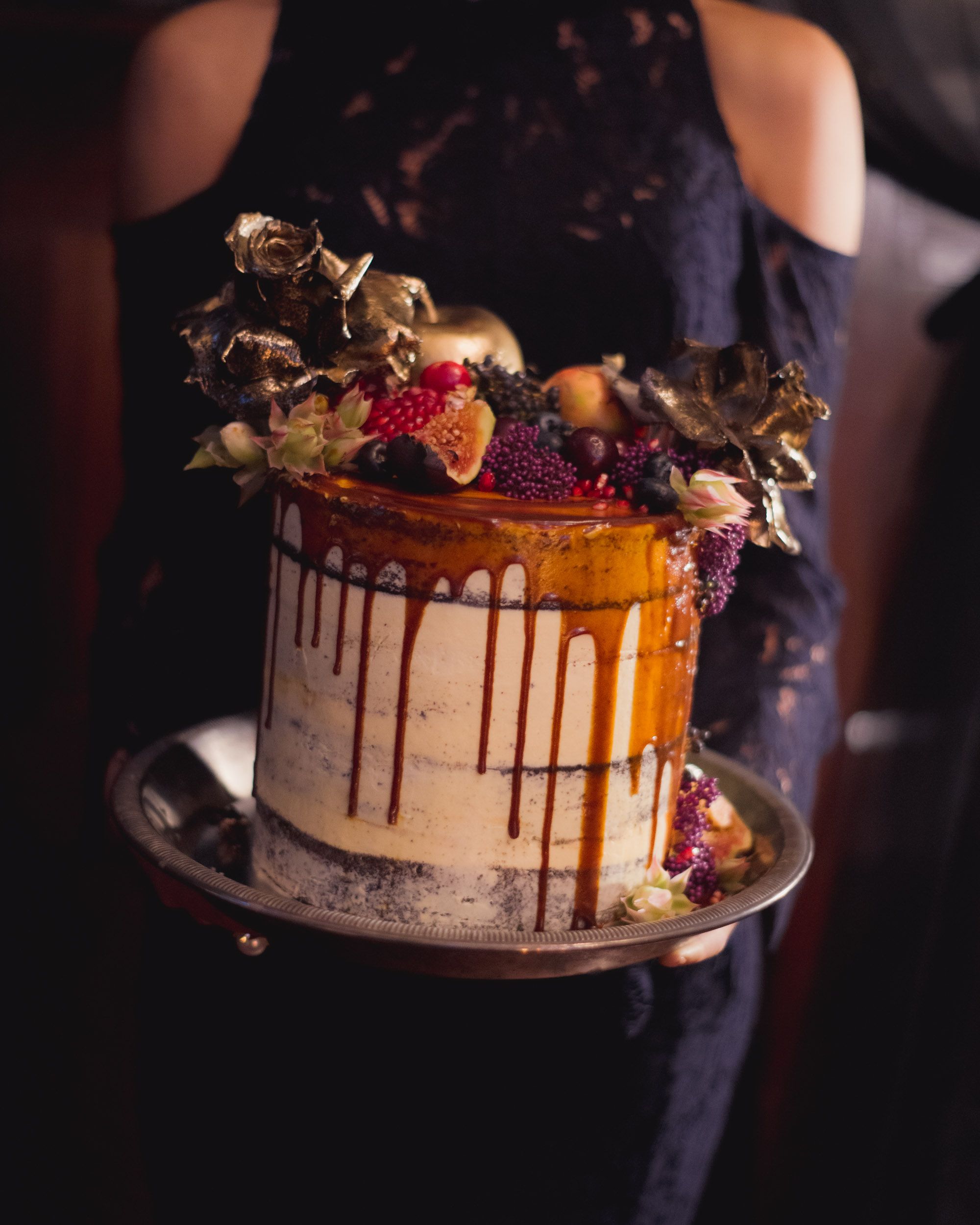 Hand Holding Dessert Outdoors · Free Stock Photo