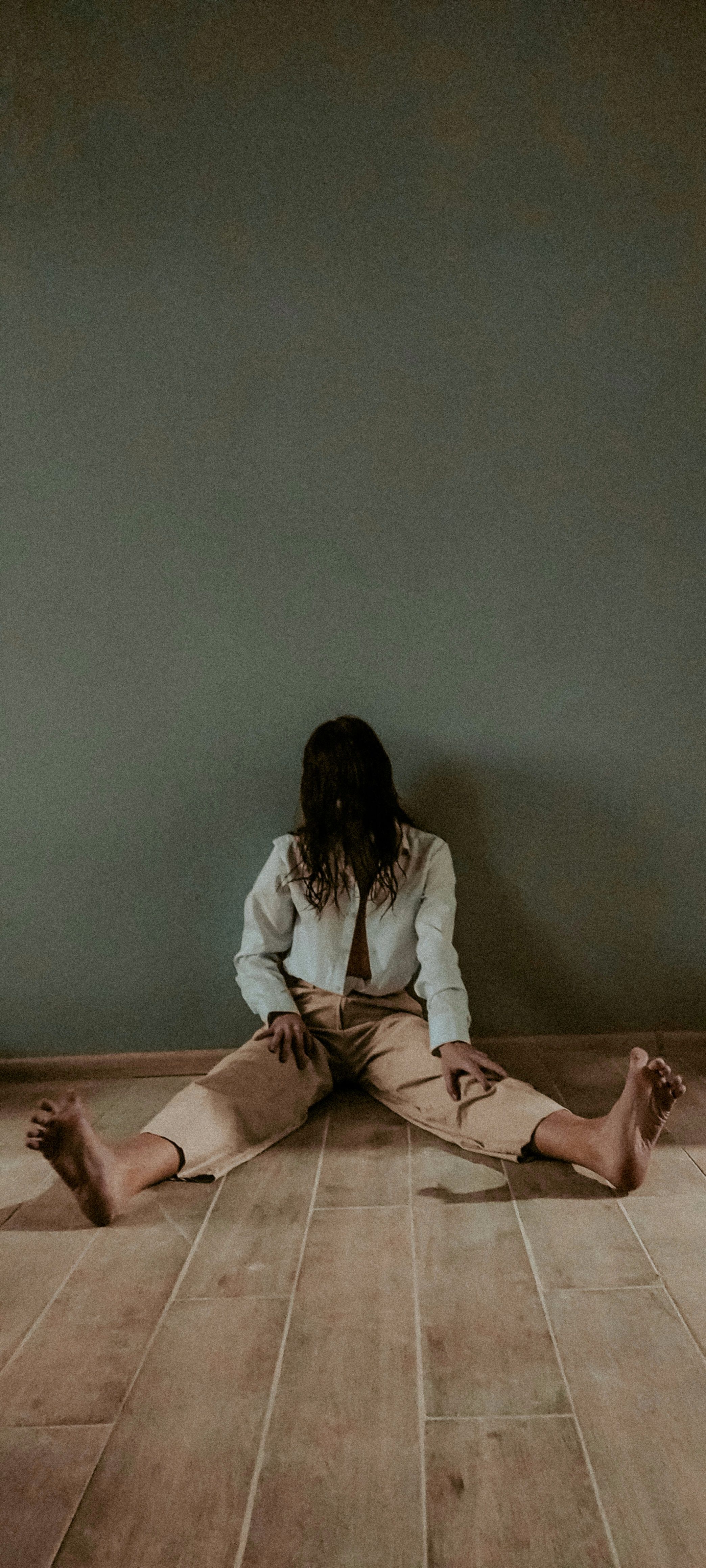 Resigned Man Sitting on Floor · Free Stock Photo