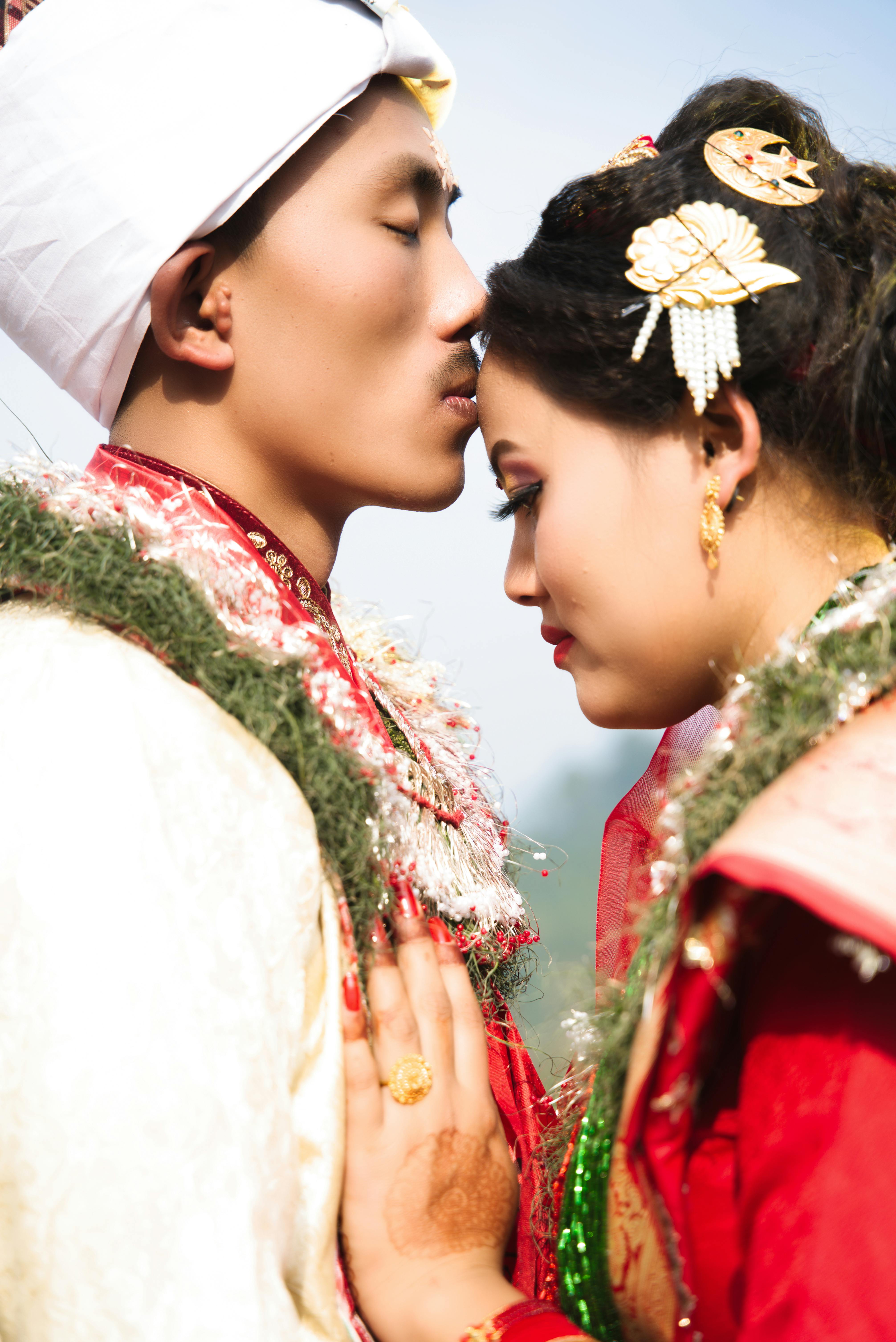 Groom Kissing the Bride · Free Stock Photo