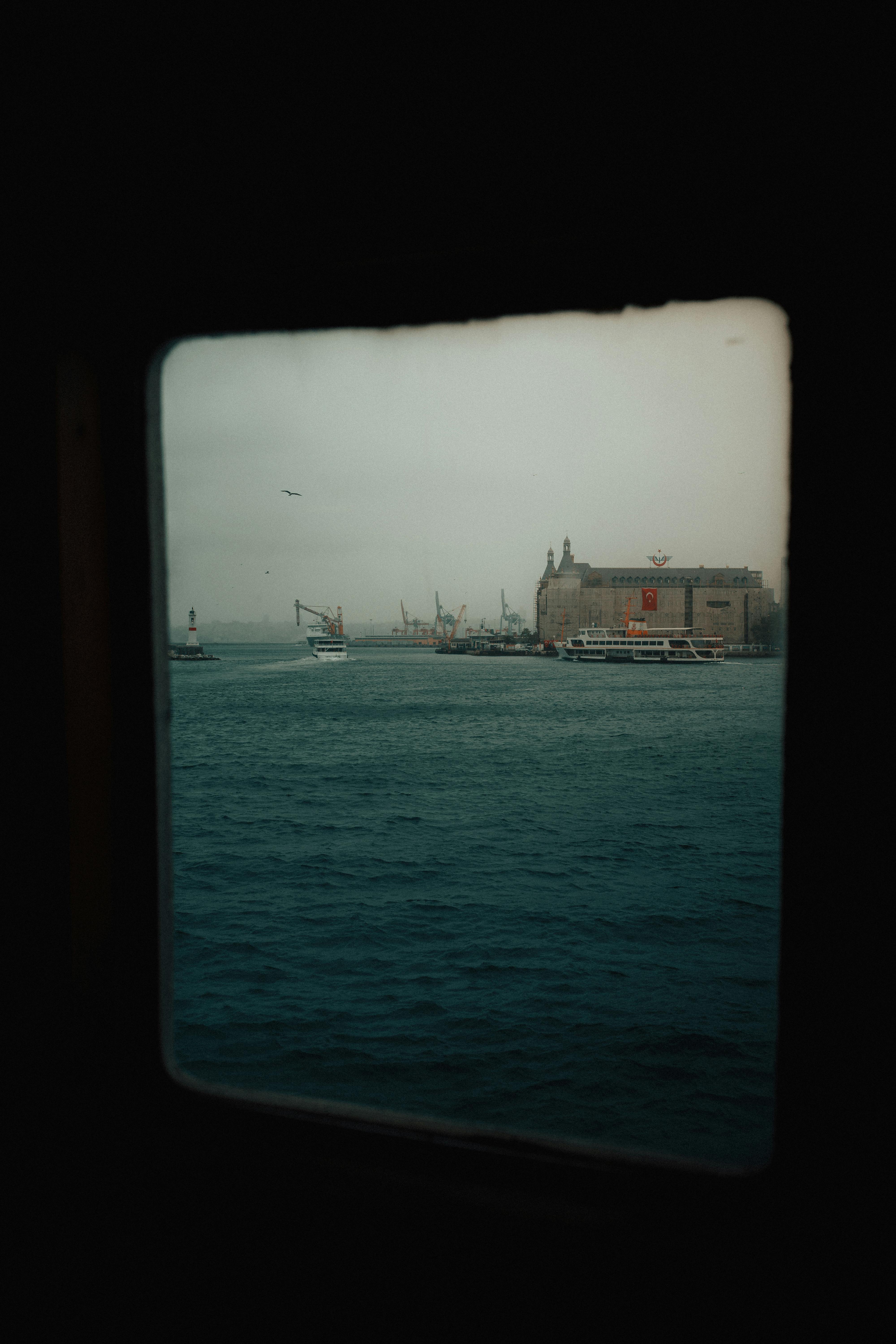 A Harbor seen from a Window · Free Stock Photo