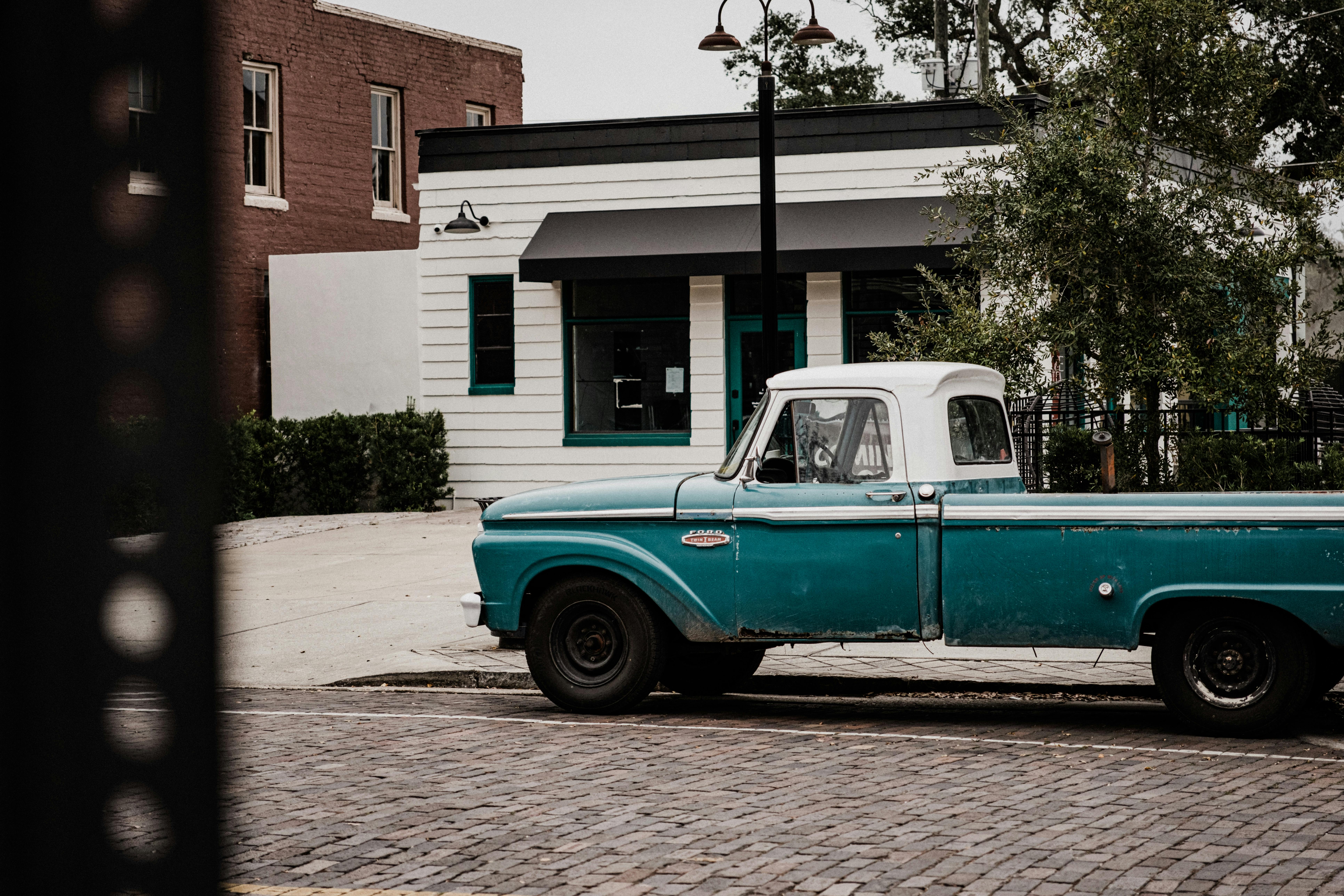 Photo of Blue Classic Pick Up Truck Parked on Roadside · Free Stock Photo