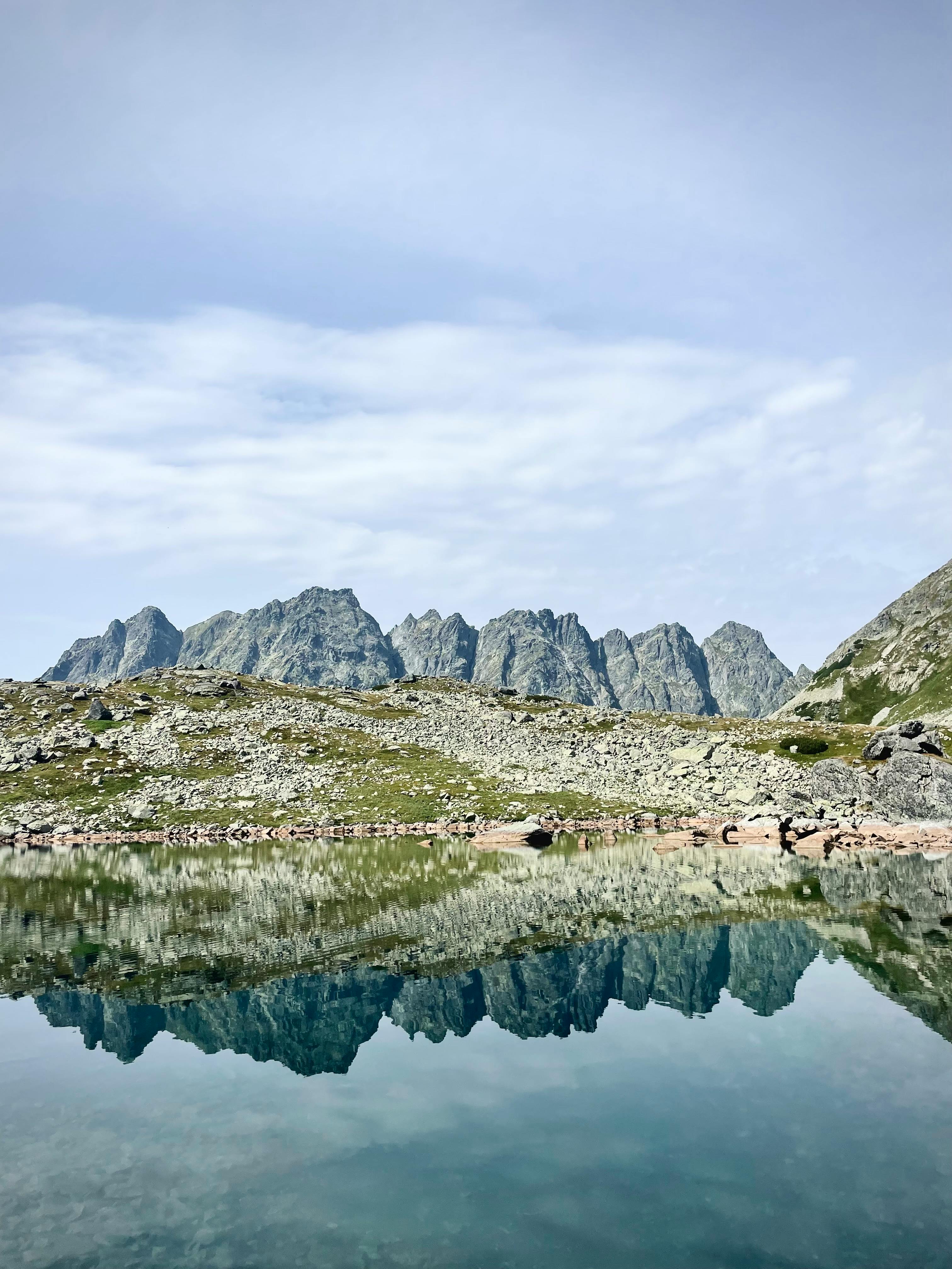 Rock Formations Reflecting in Lake · Free Stock Photo