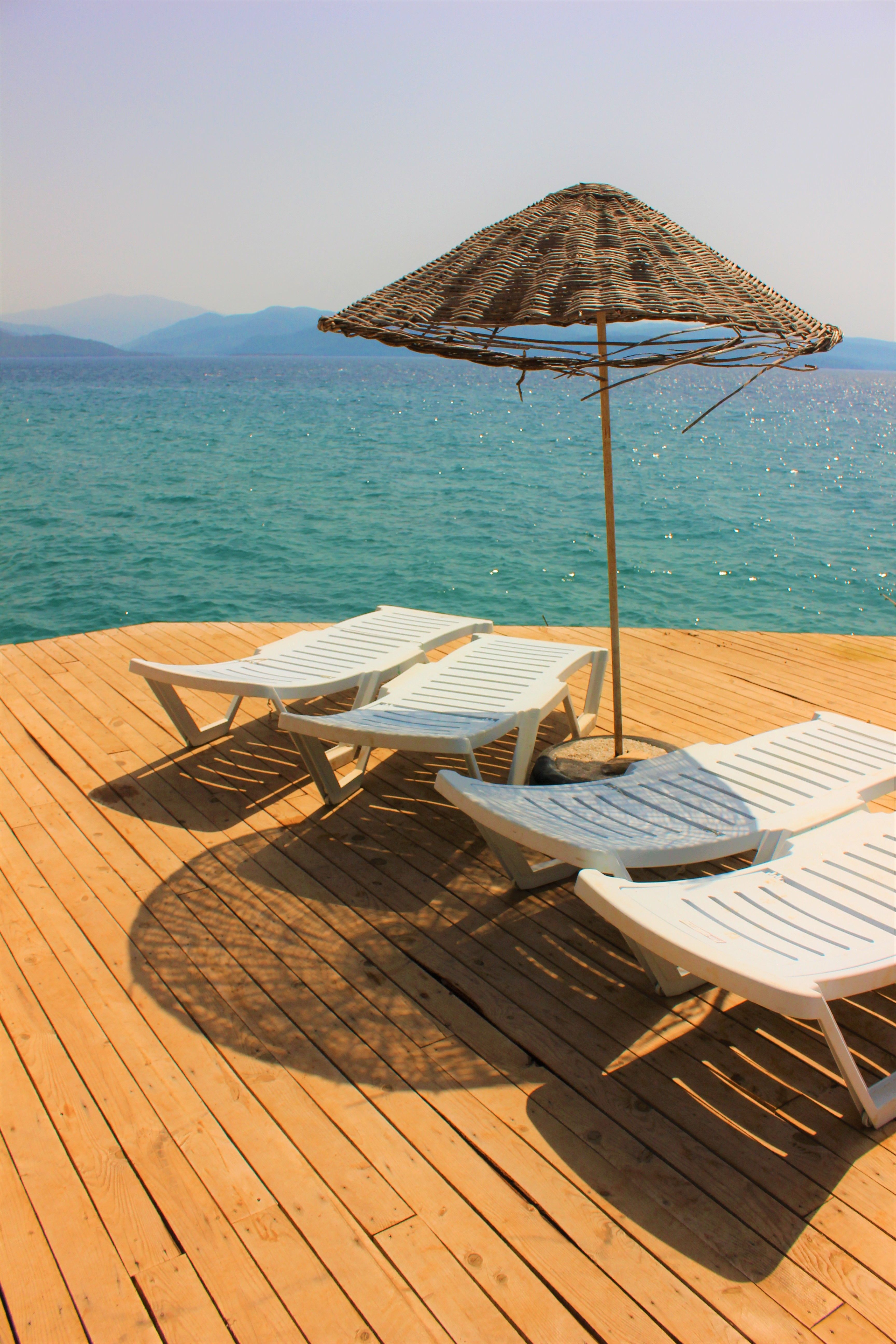 Foto de stock gratuita sobre cubierta de madera, mar, oceano, sillones ...