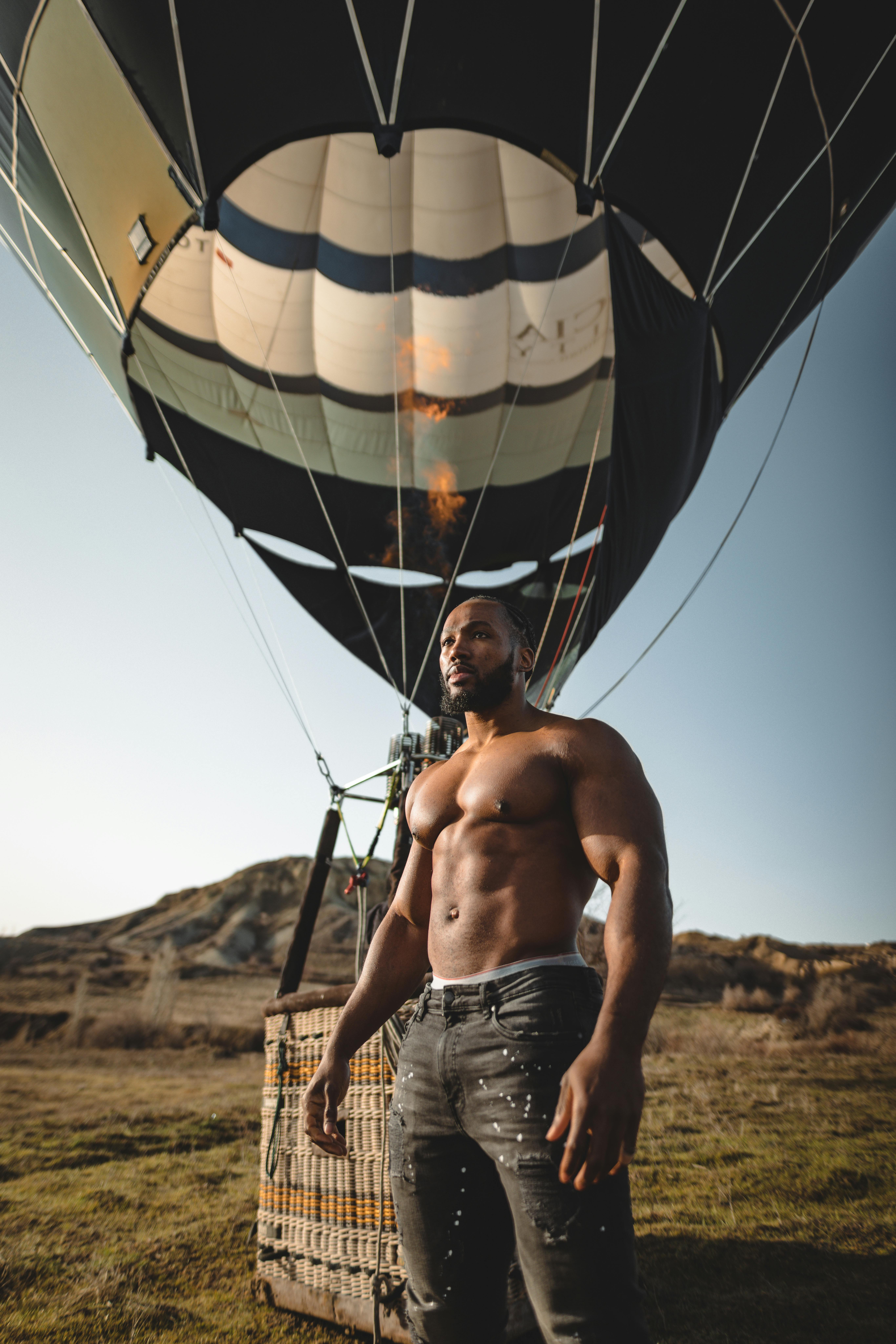 Muscular Man by Hot Air Balloon · Free Stock Photo