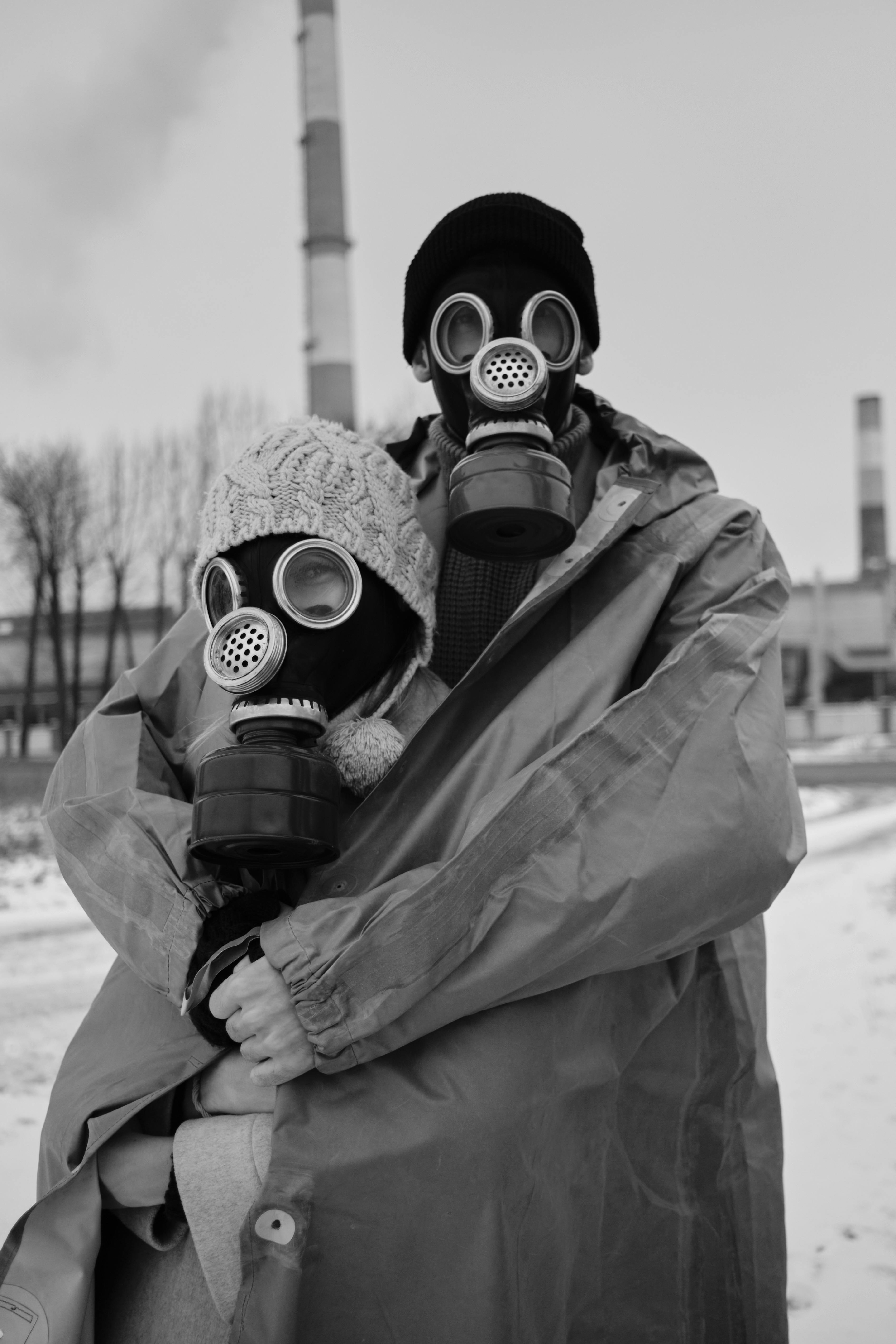 A Couple Wearing Gas Masks · Free Stock Photo