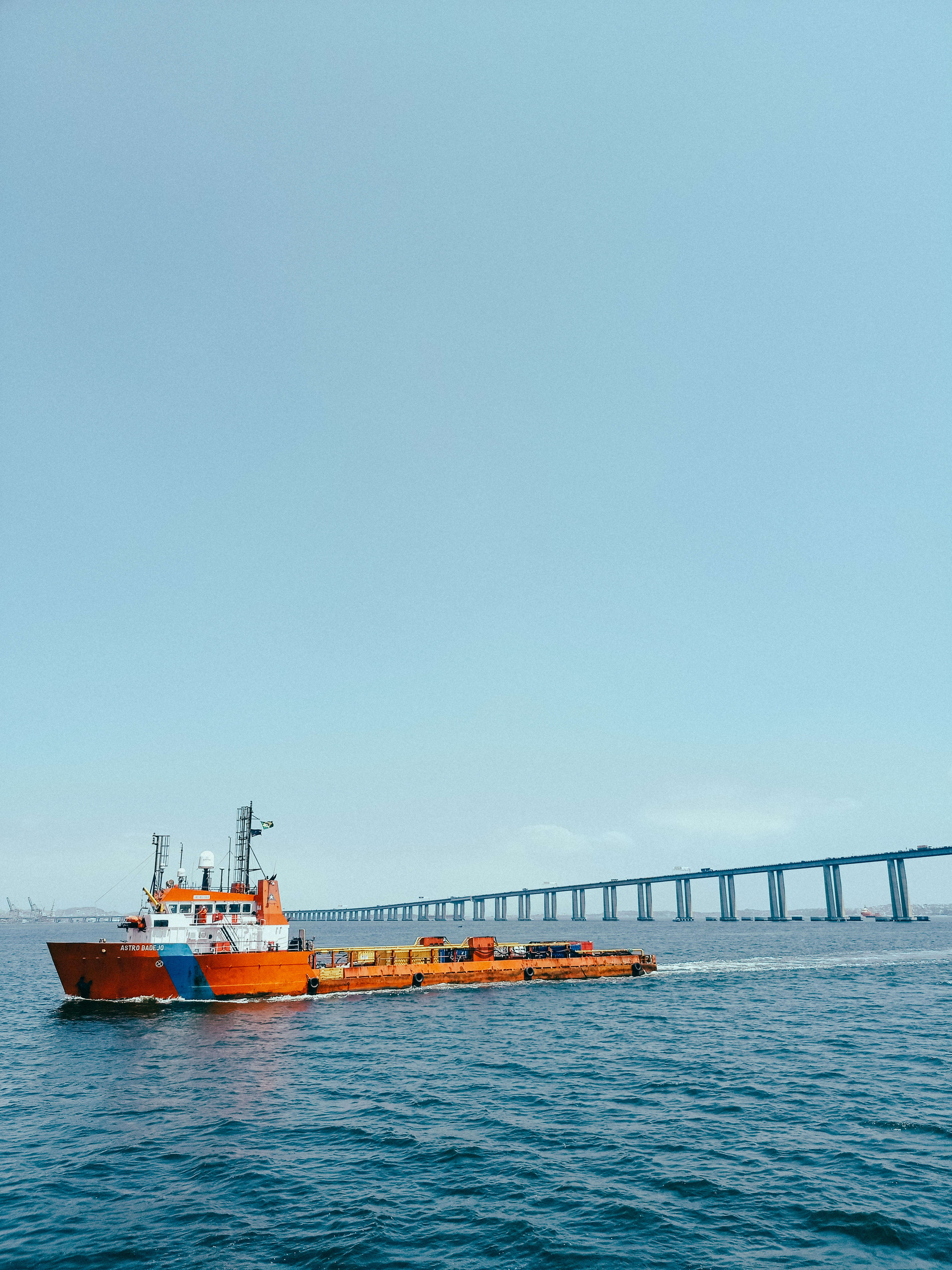 Orange Ship on Water · Free Stock Photo