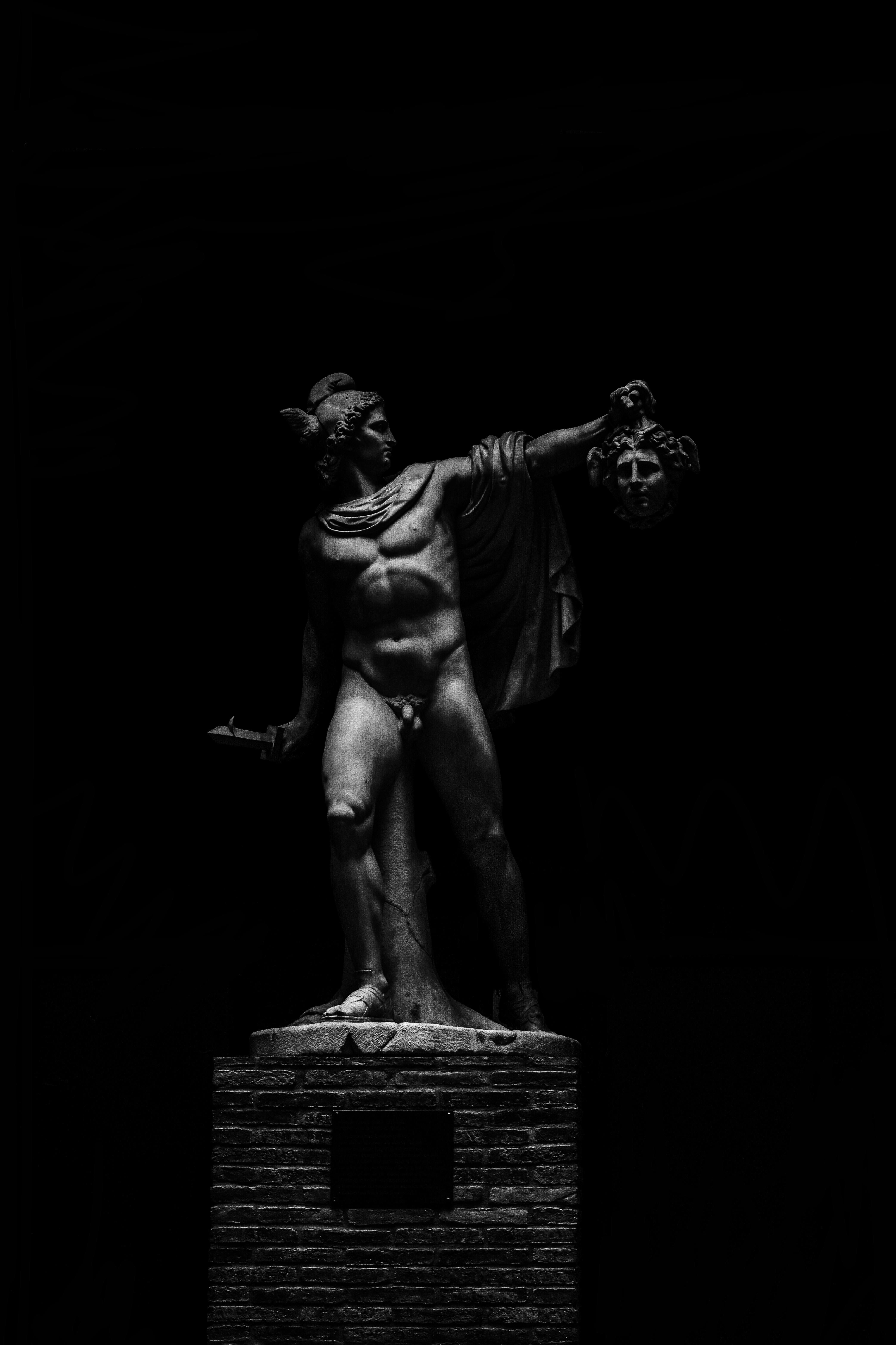 Grayscale Photo of a Statue · Free Stock Photo