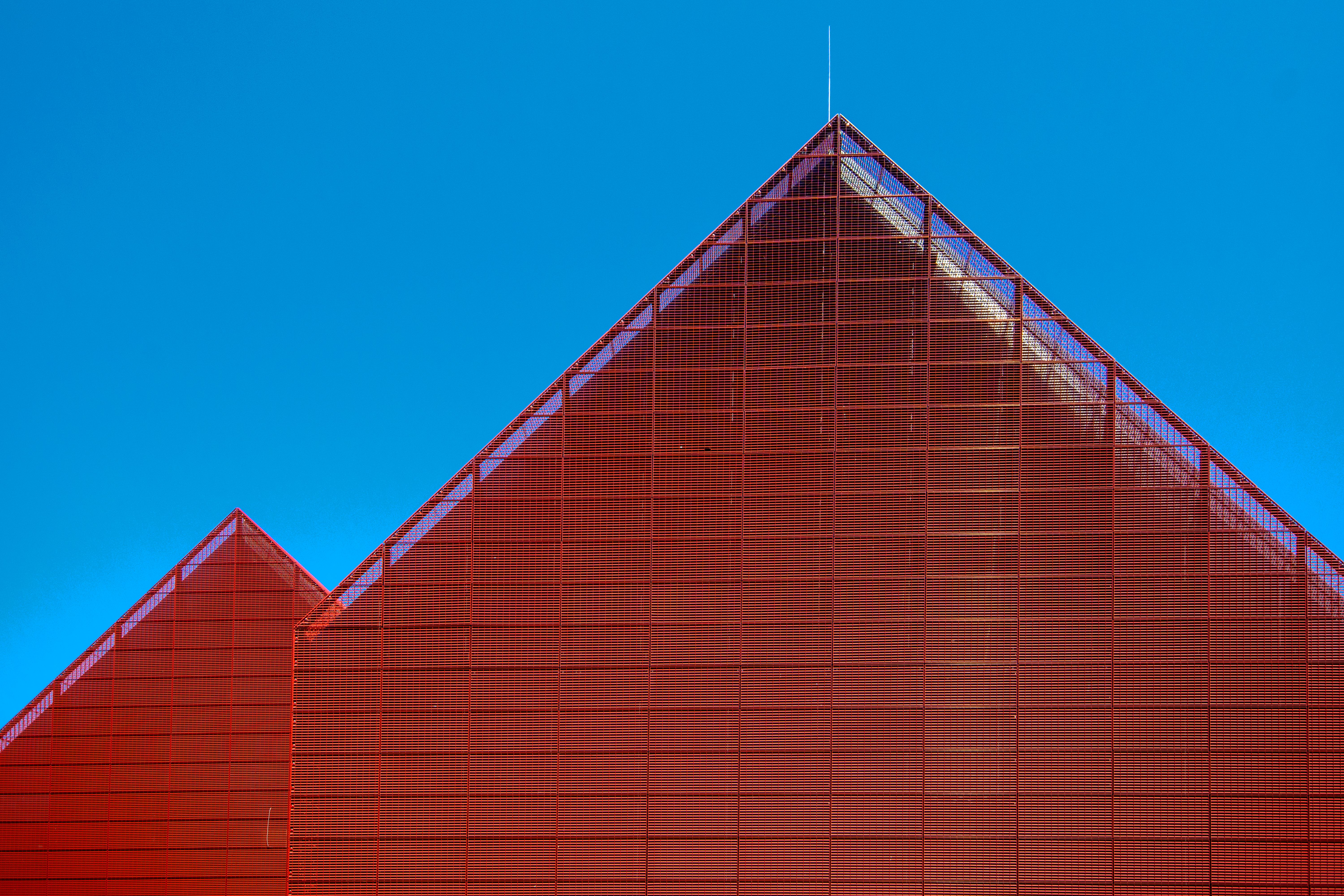 Facade of a Red Building against Blue Sky · Free Stock Photo