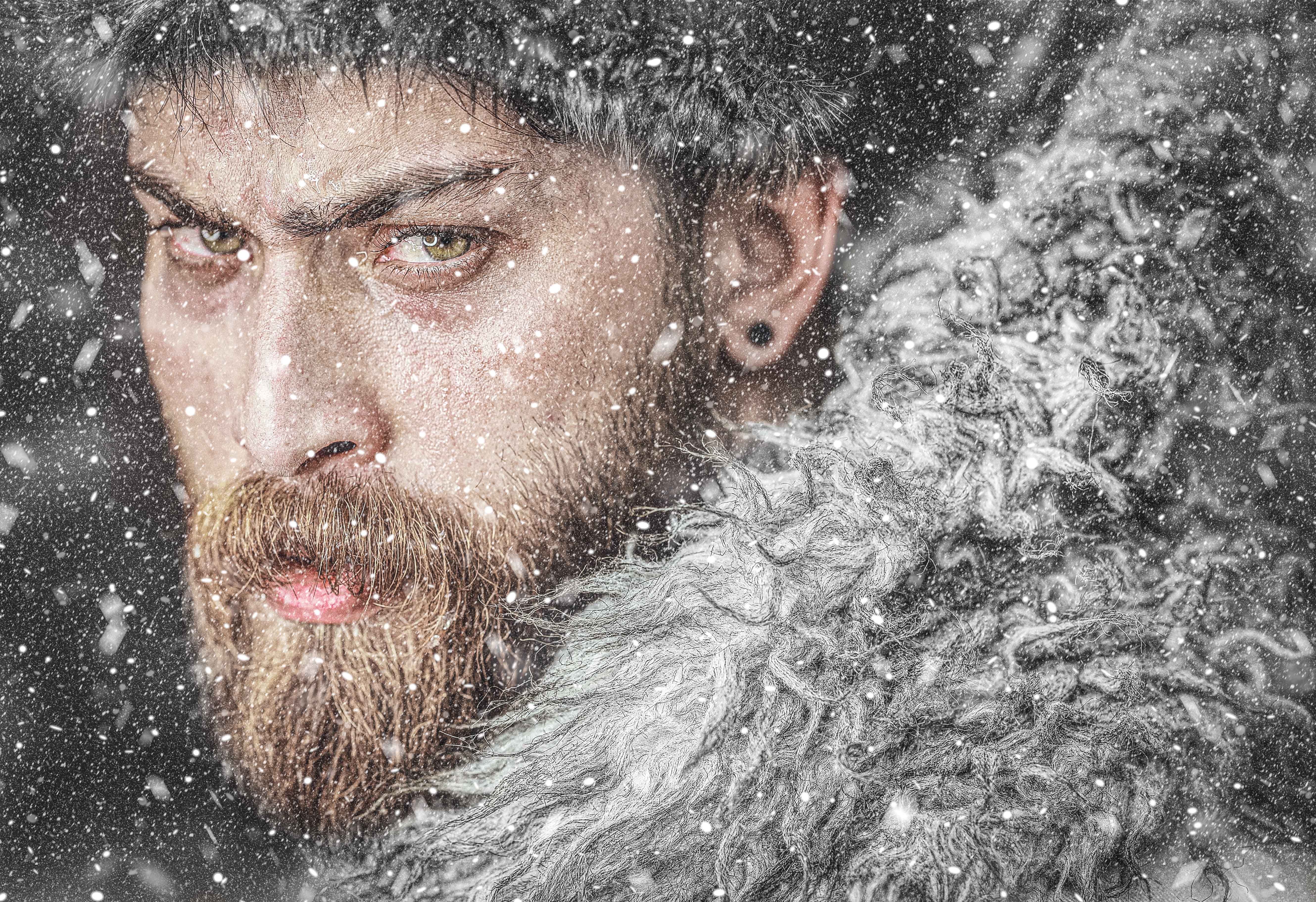 Portrait of a Bearded Man on a Snowy Day · Free Stock Photo